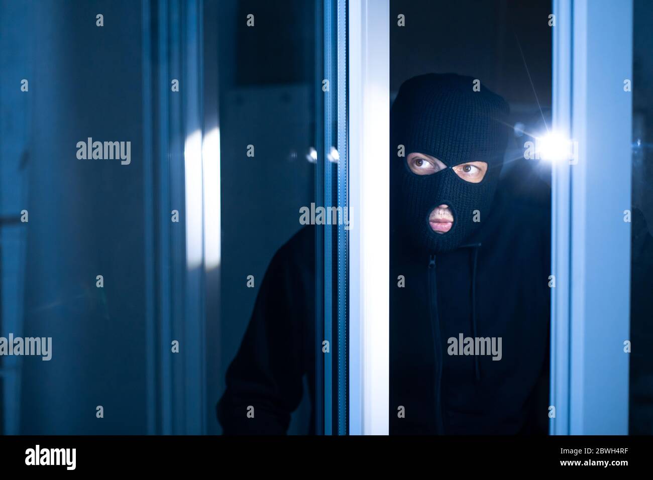 Burglar breaking in home hi-res stock photography and images - Alamy