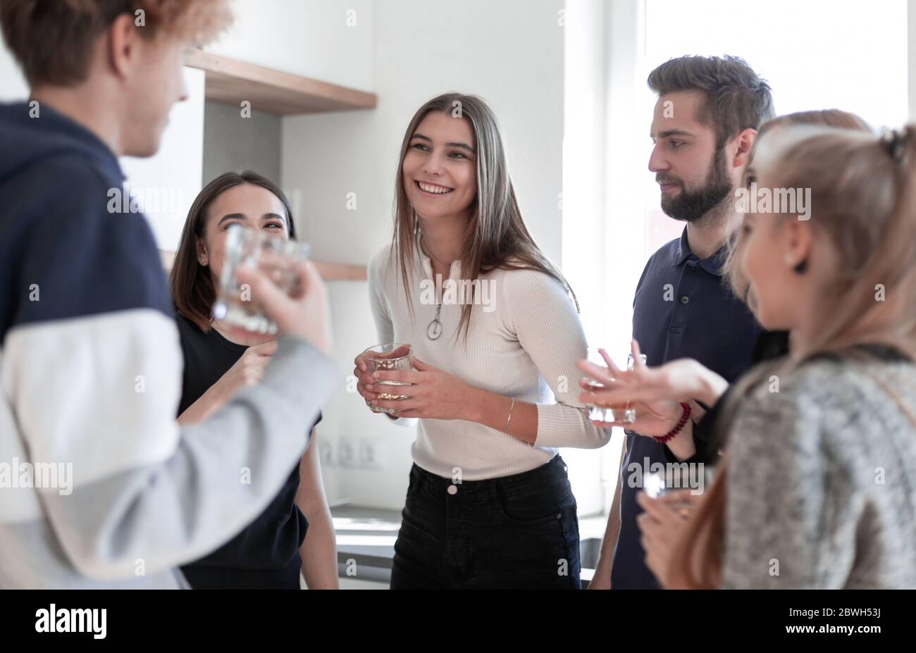 Happy friends cheering together with glasses Stock Photo - Alamy