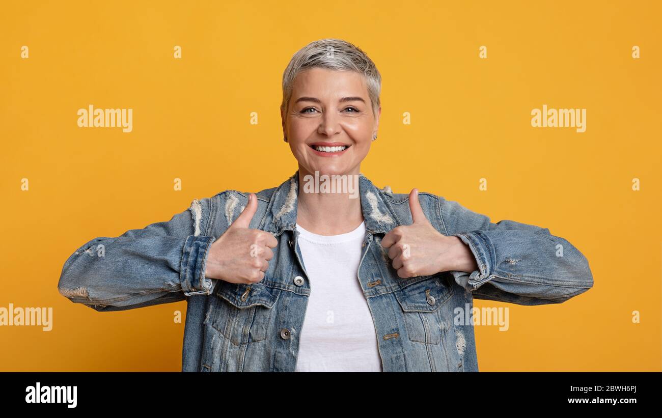 Woman face smiling widely hi-res stock photography and images - Alamy