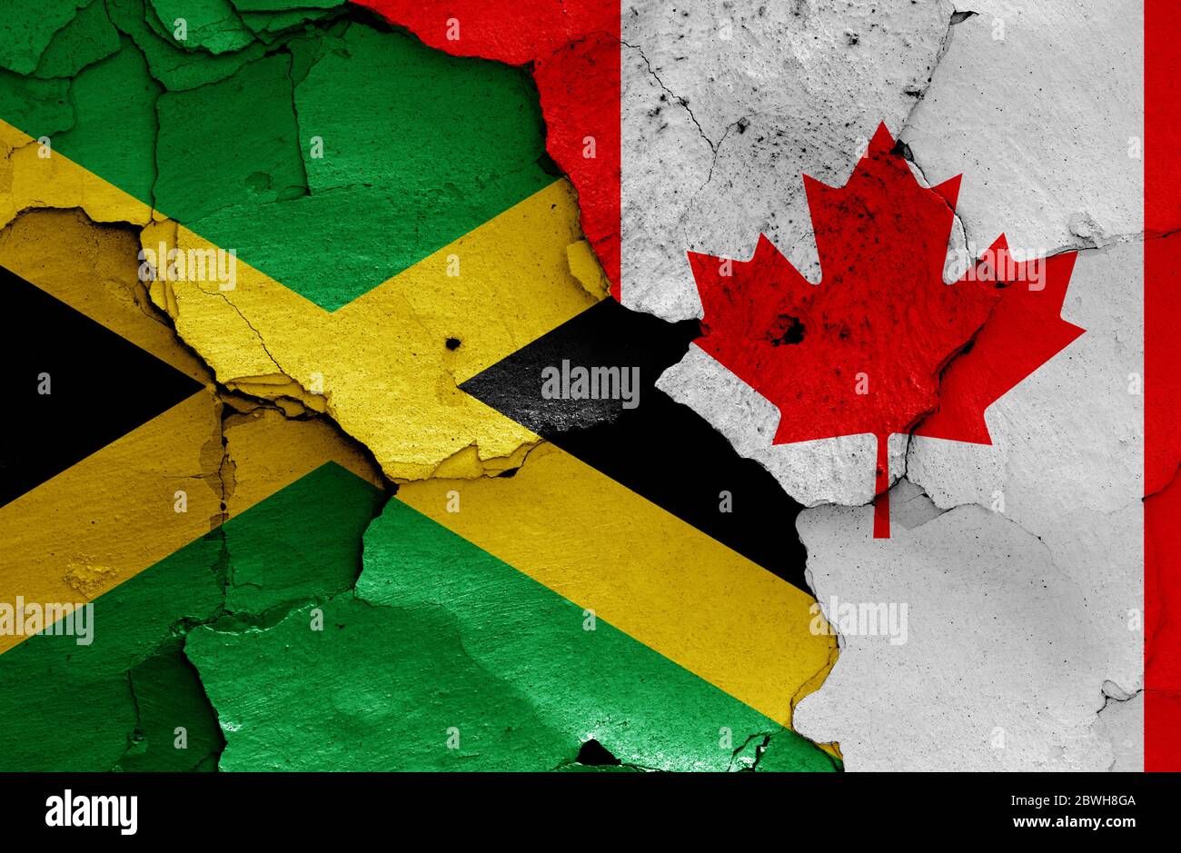 flags of Jamaica and Canada painted on cracked wall Stock Photo - Alamy