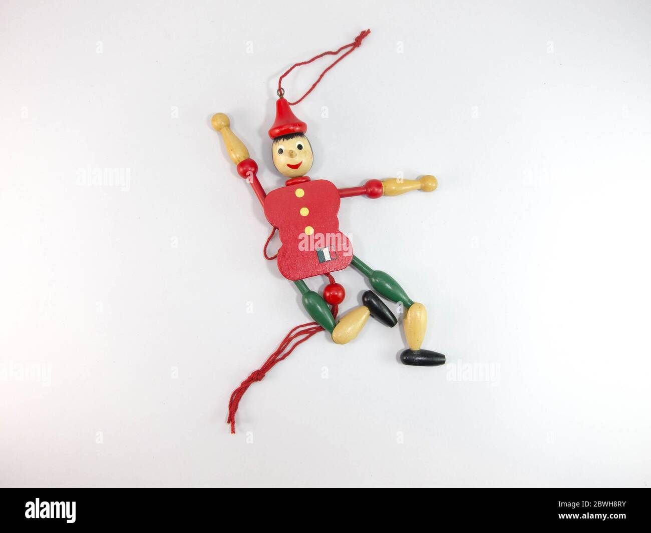 puppet Old wood Green and red puppet dolls On a white background Stock ...