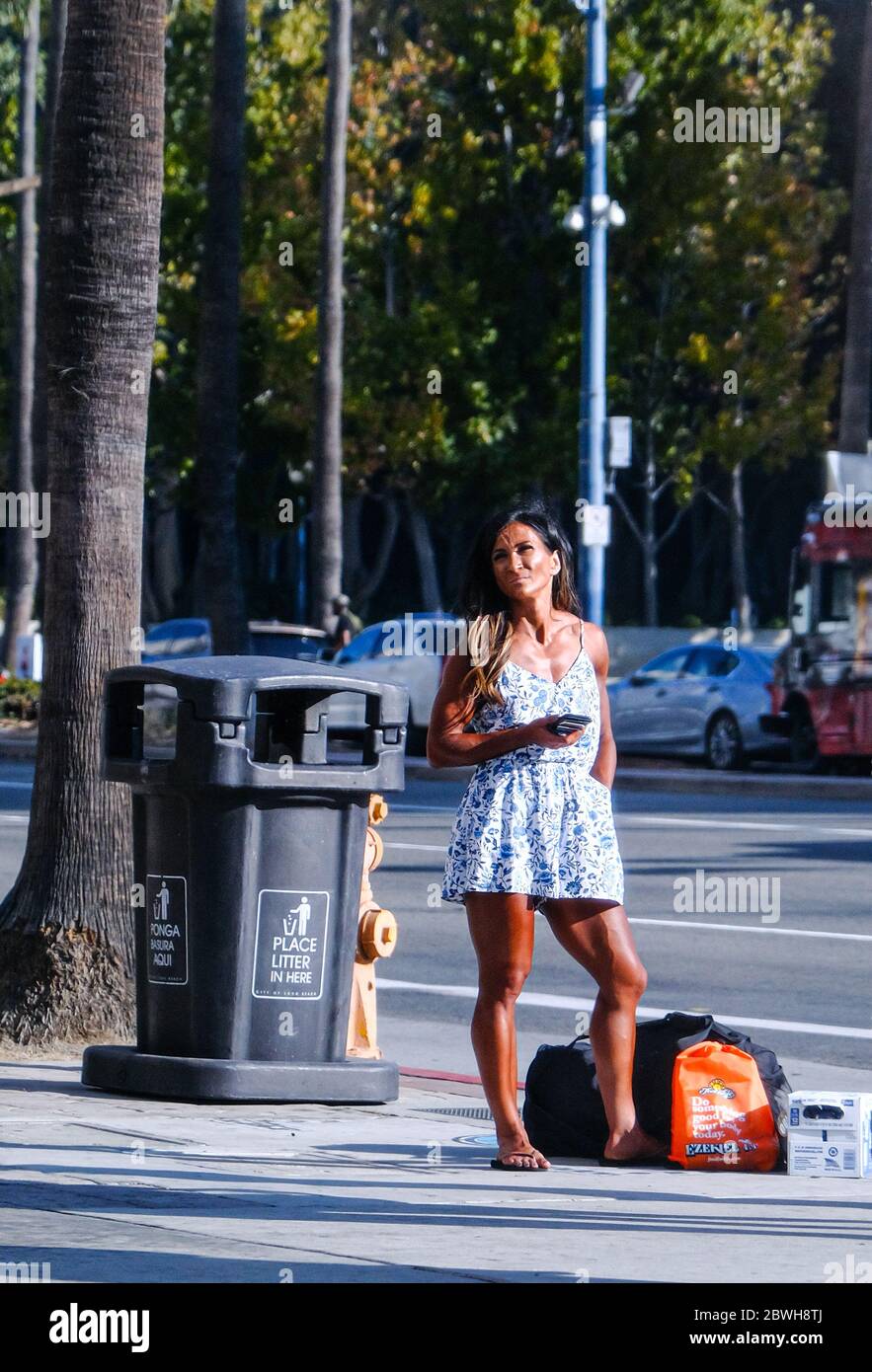 Woman waiting by phone hi-res stock photography and images - Alamy