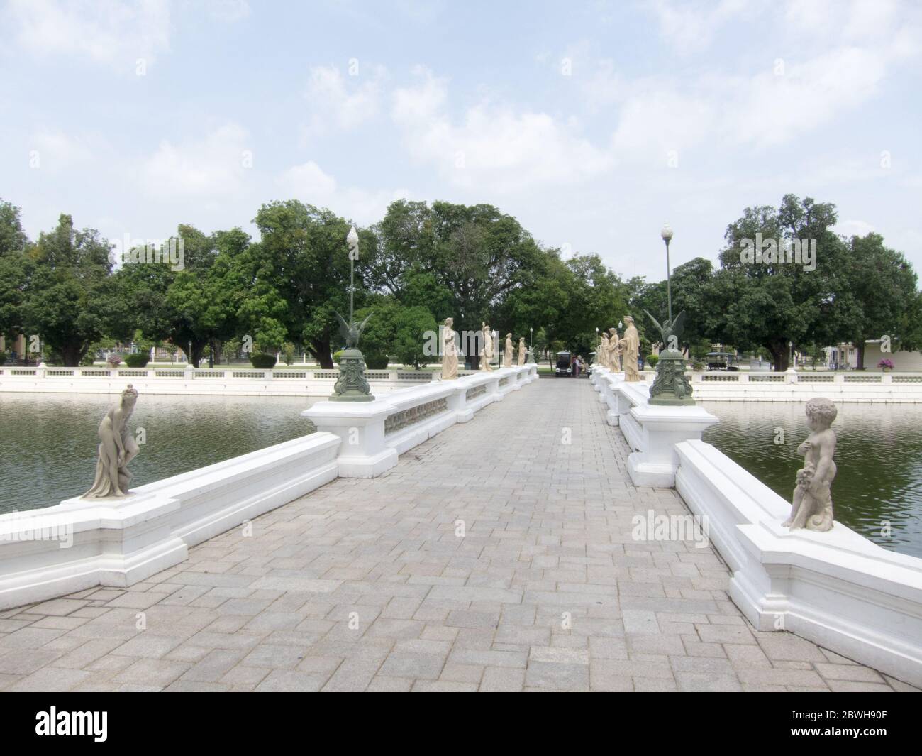 Rock bridge, cupid statue in the park Stock Photo - Alamy