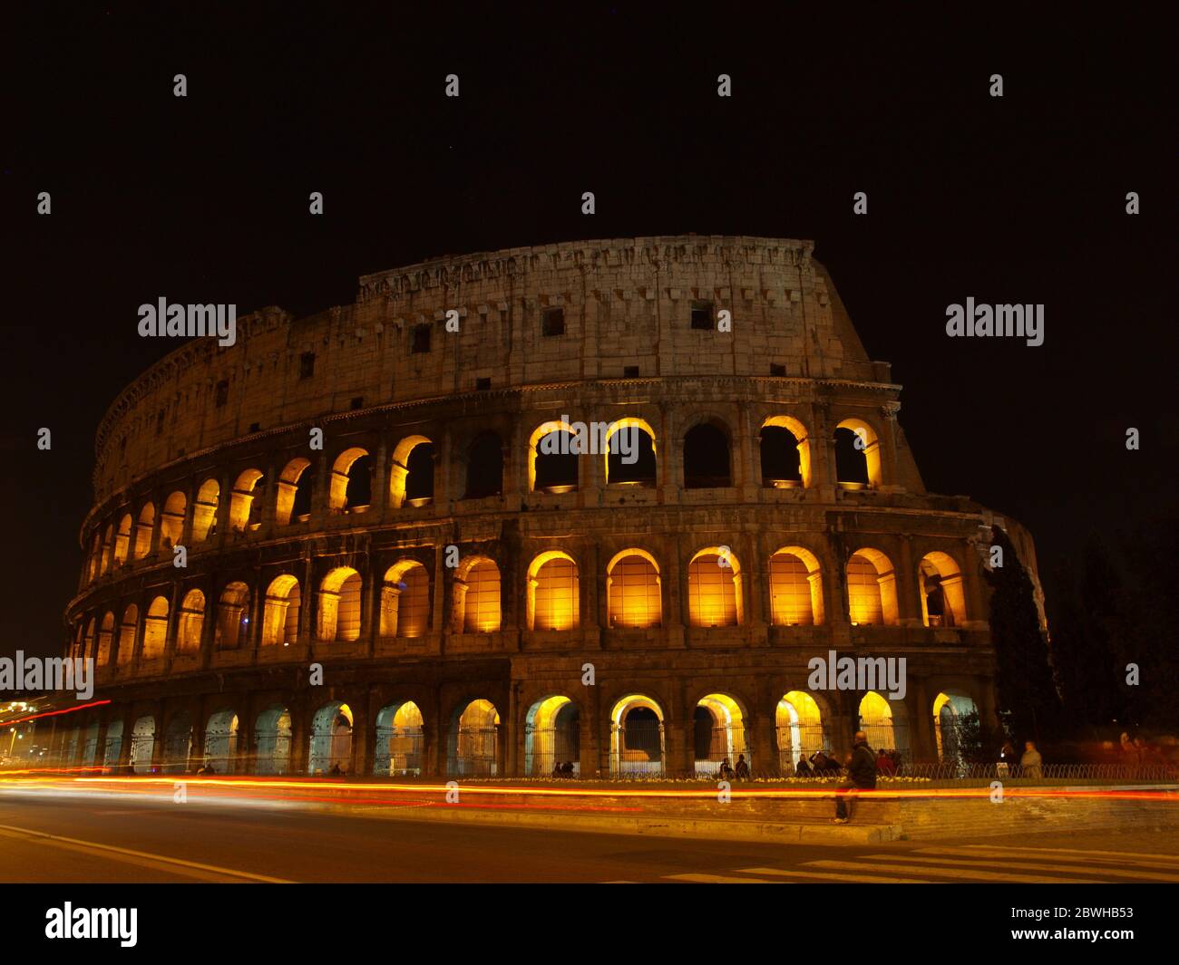 Rome Colosseum illuminated at night Stock Photo - Alamy