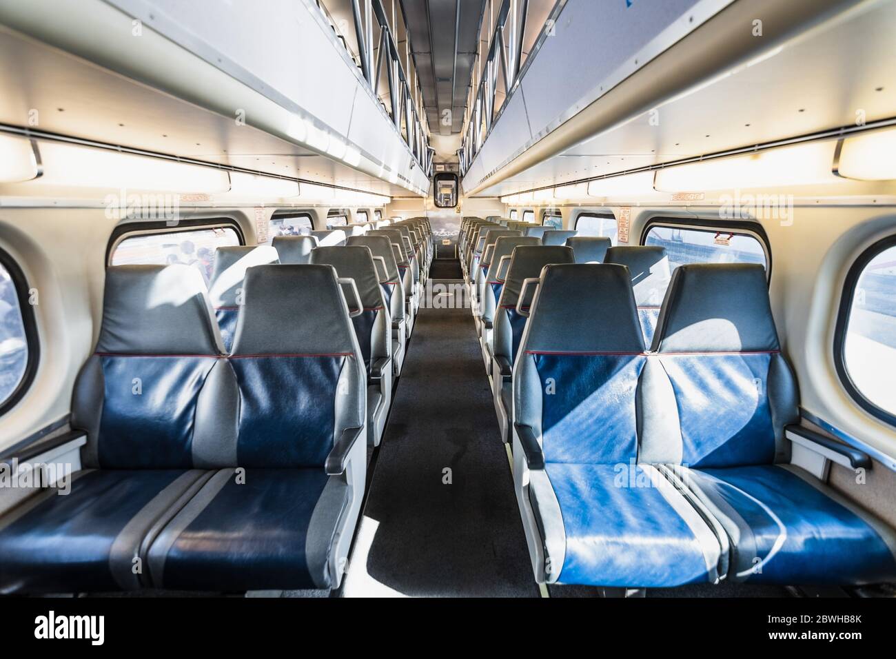 Interior view of an empty passenger train car Stock Photo - Alamy