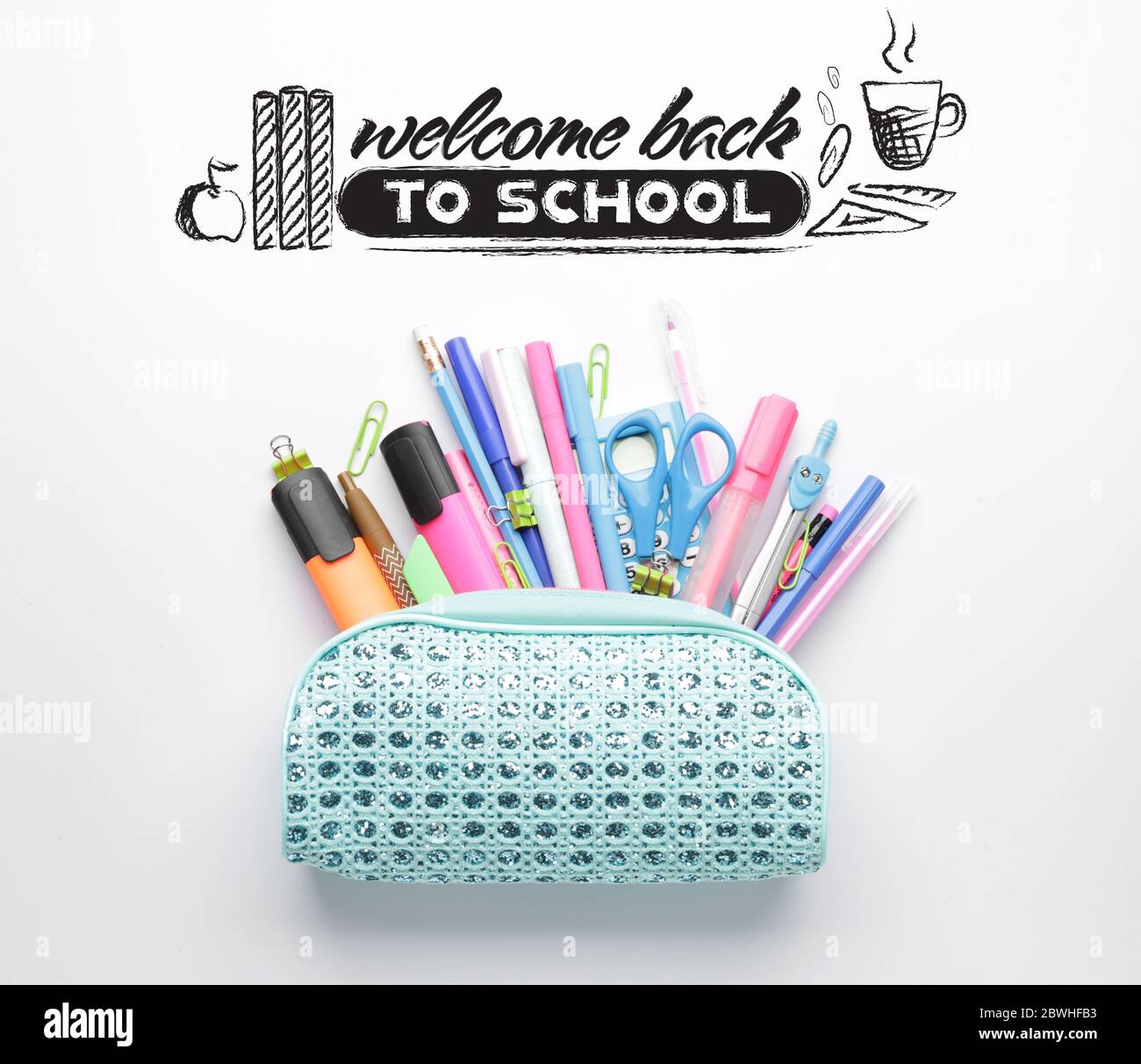 Pencil bag with stationery and text WELCOME BACK TO SCHOOL on white ...