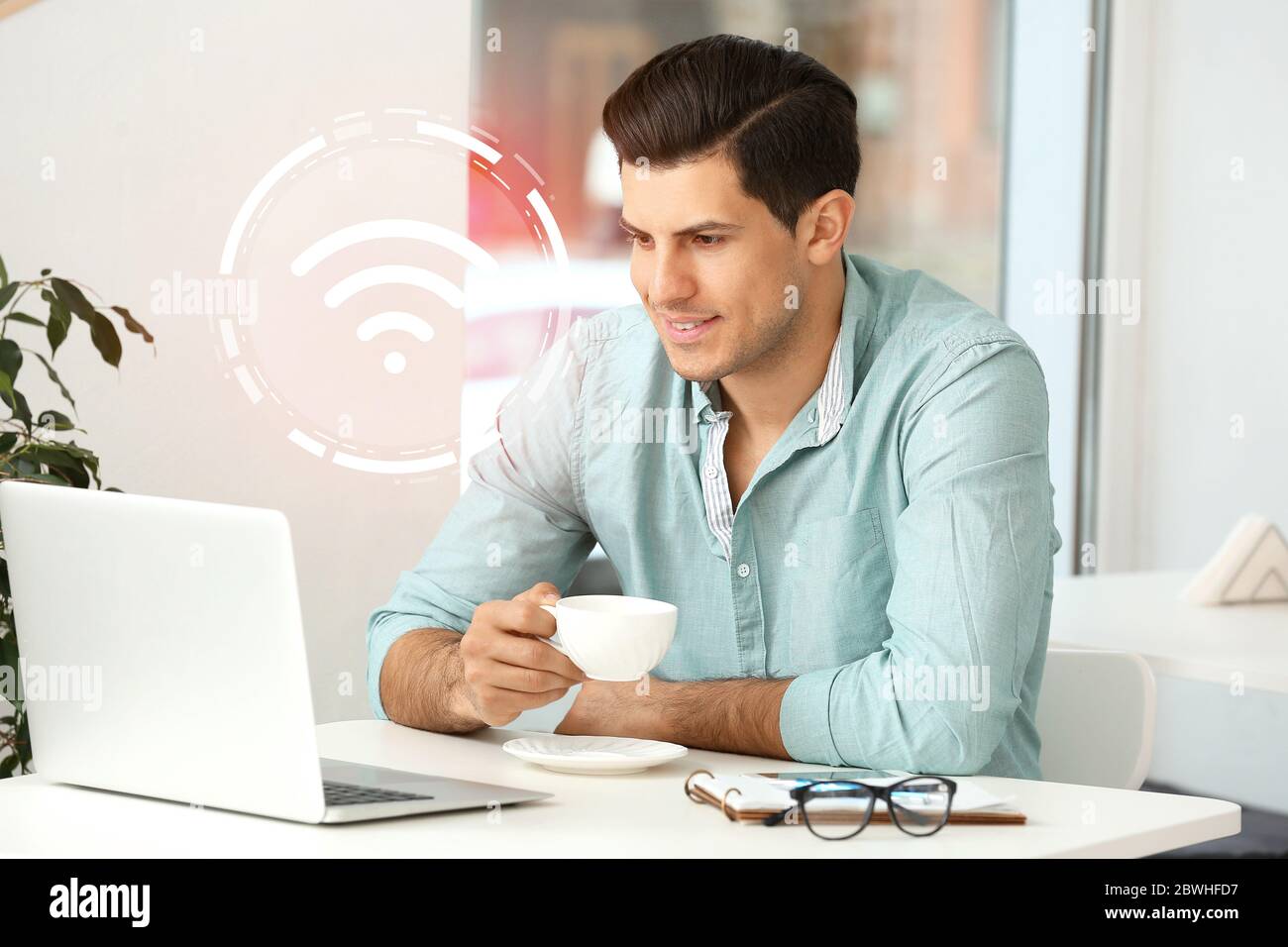 Person using wifi access point hi-res stock photography and images - Alamy