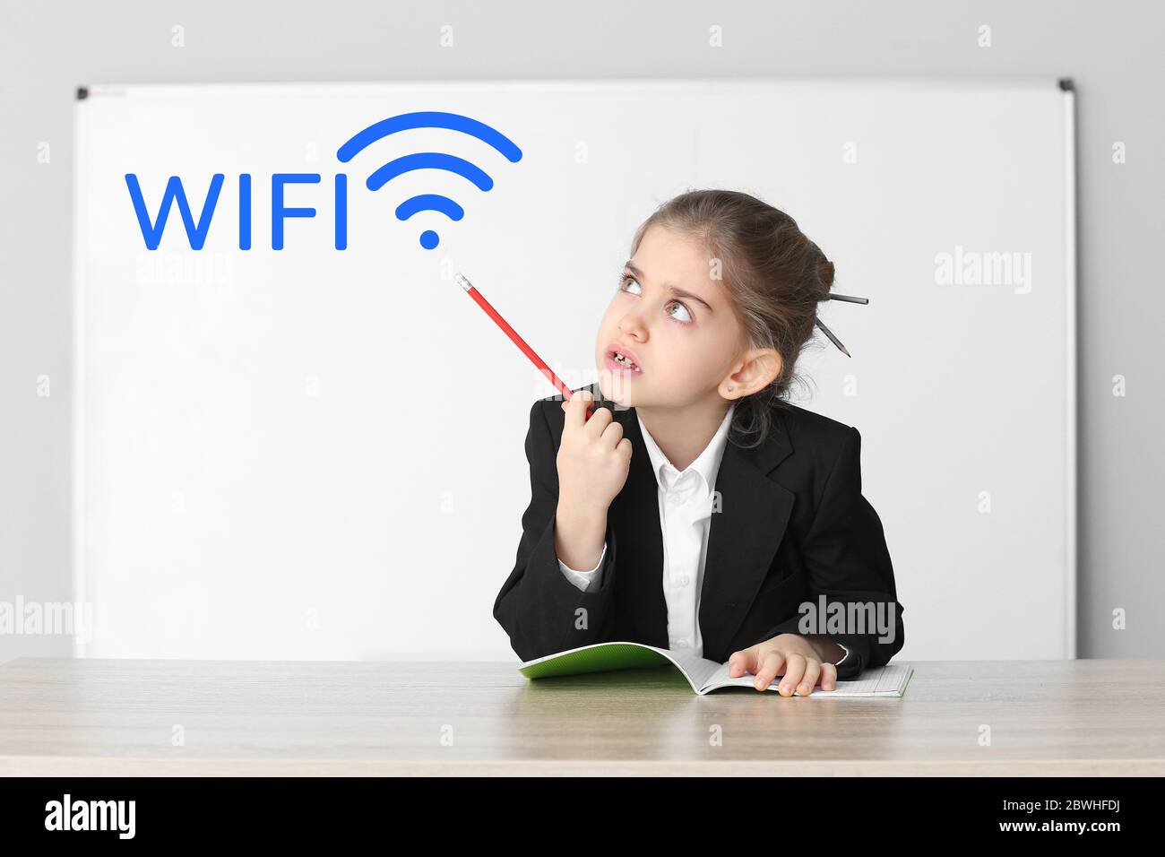 Schoolgirl in classroom wifi hi-res stock photography and images - Alamy