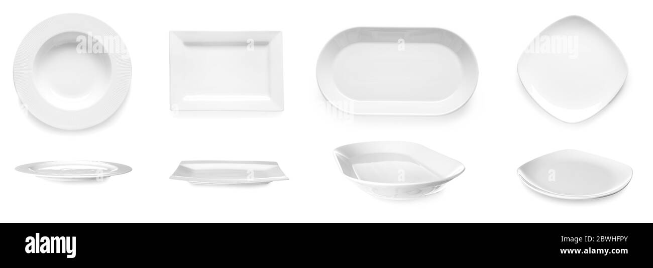 Set of empty ceramic plates on white background Stock Photo - Alamy