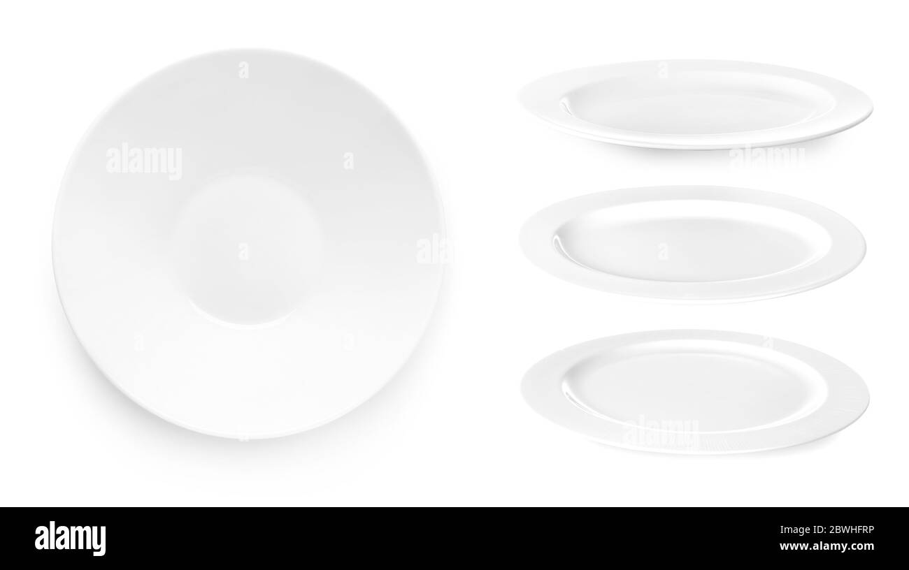 Empty ceramic plates on white background Stock Photo - Alamy