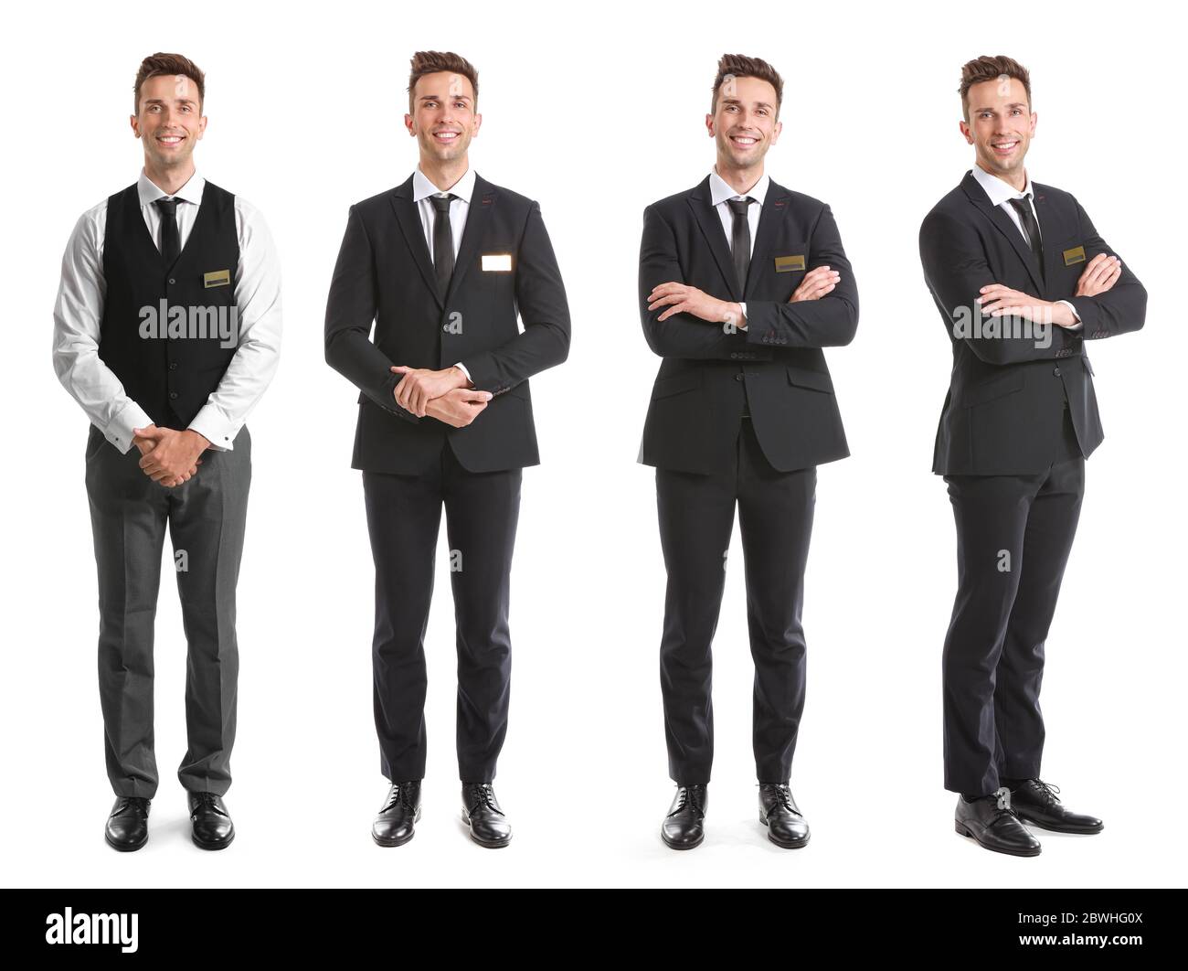 Male receptionist on white background Stock Photo - Alamy
