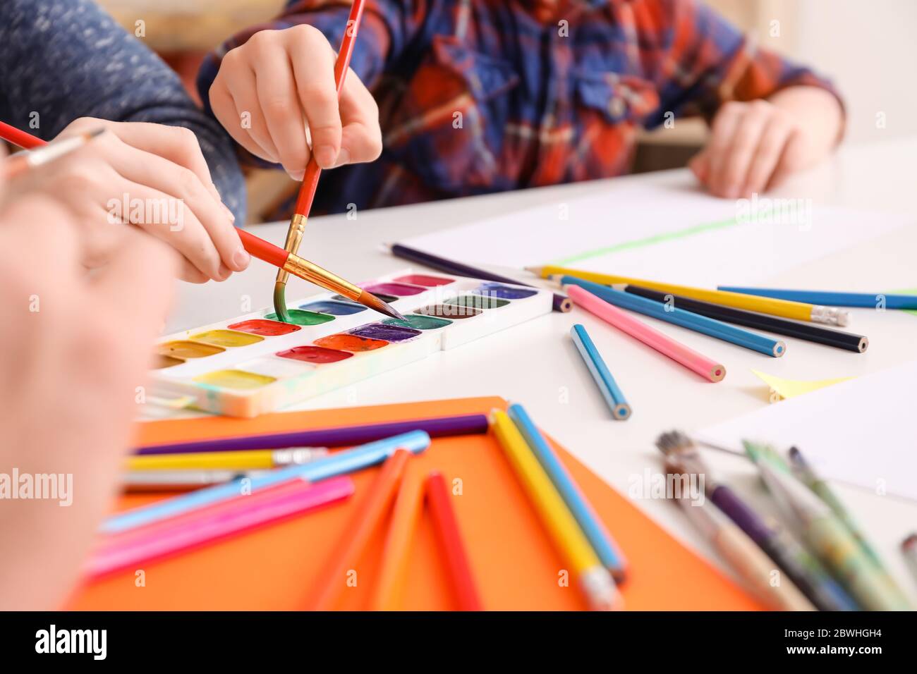 Drawing teacher giving private lessons at home, closeup Stock Photo - Alamy