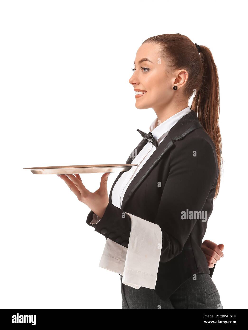 Beautiful female waiter on white background Stock Photo - Alamy