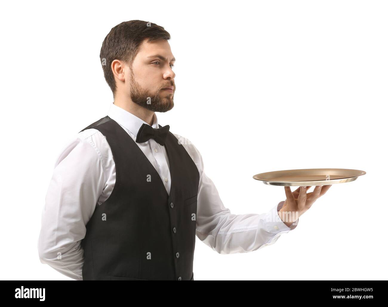 Handsome male waiter on white background Stock Photo - Alamy