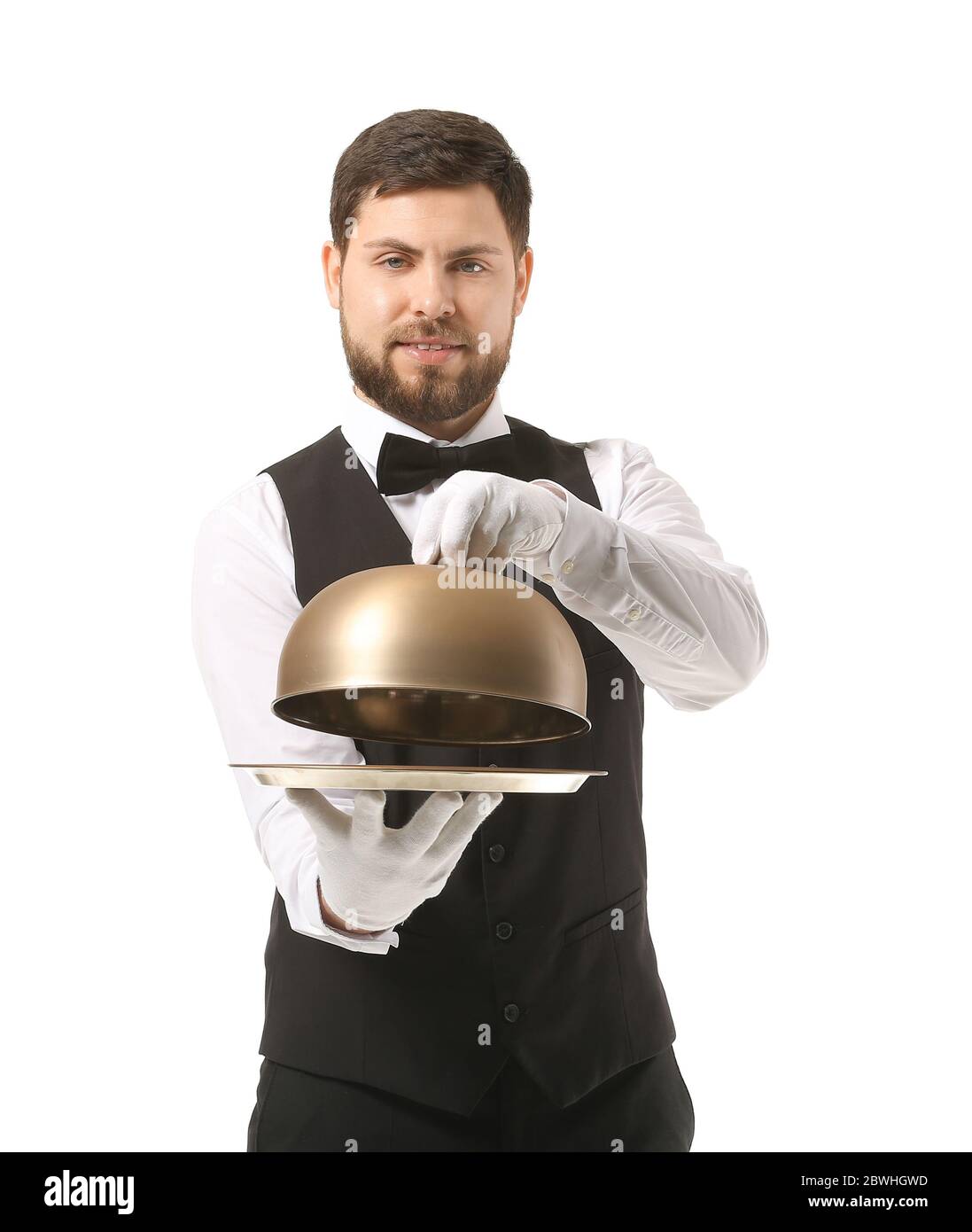 Handsome male waiter with tray and cloche on white background Stock ...