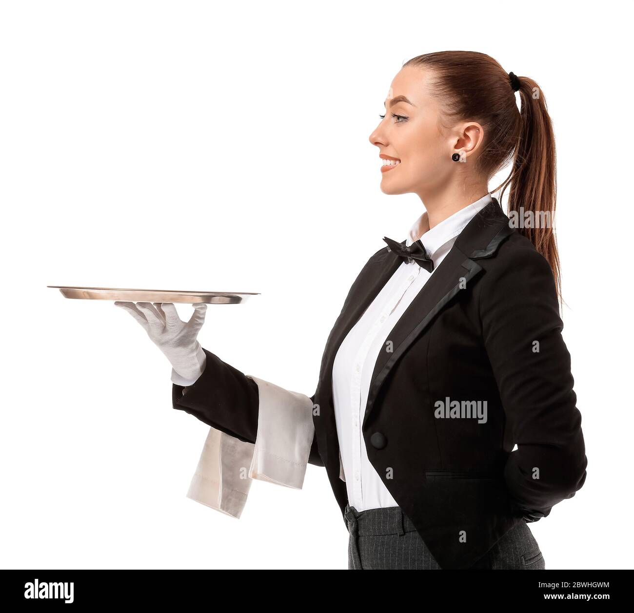 Beautiful female waiter on white background Stock Photo - Alamy