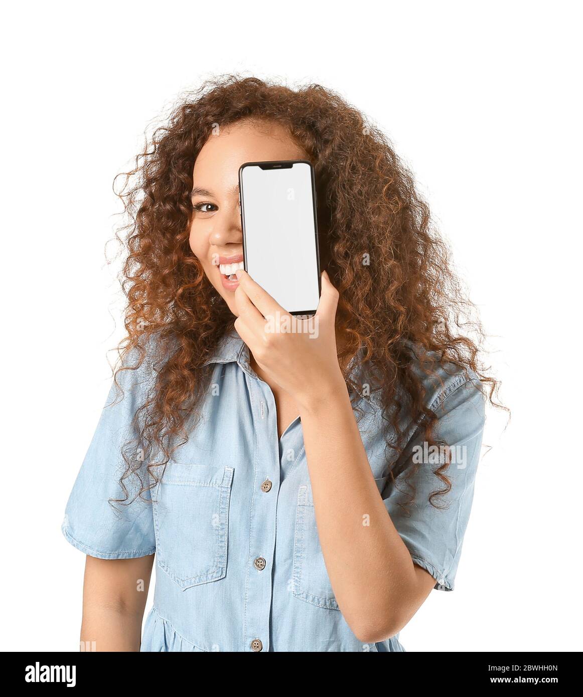 African-American woman with mobile phone on white background Stock ...