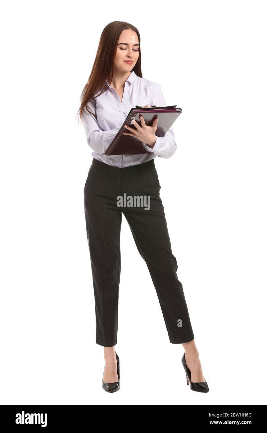 Beautiful young secretary on white background Stock Photo - Alamy