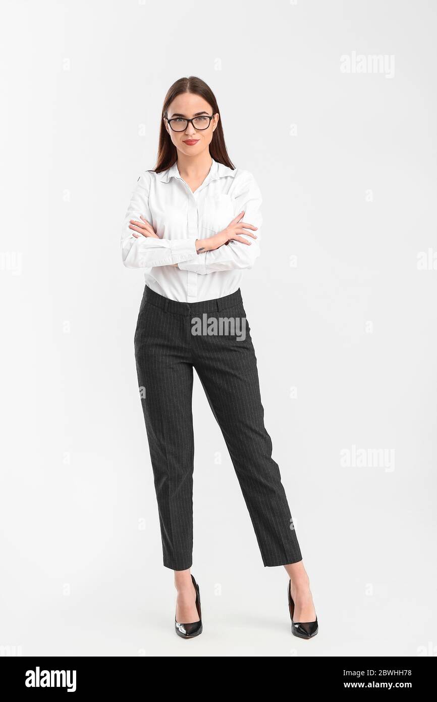 Beautiful young secretary on white background Stock Photo - Alamy