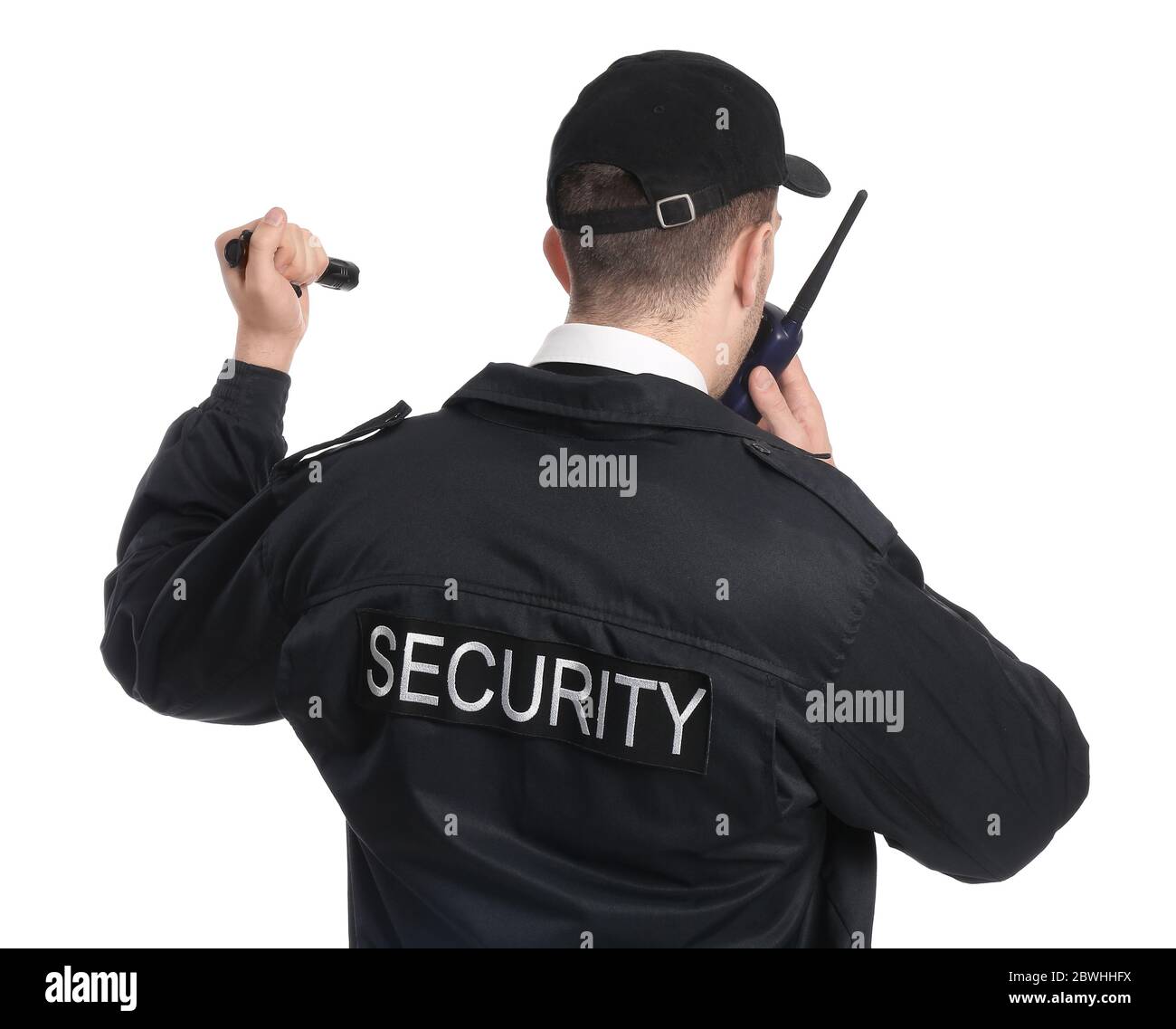 Male security guard with flashlight on white background Stock Photo - Alamy