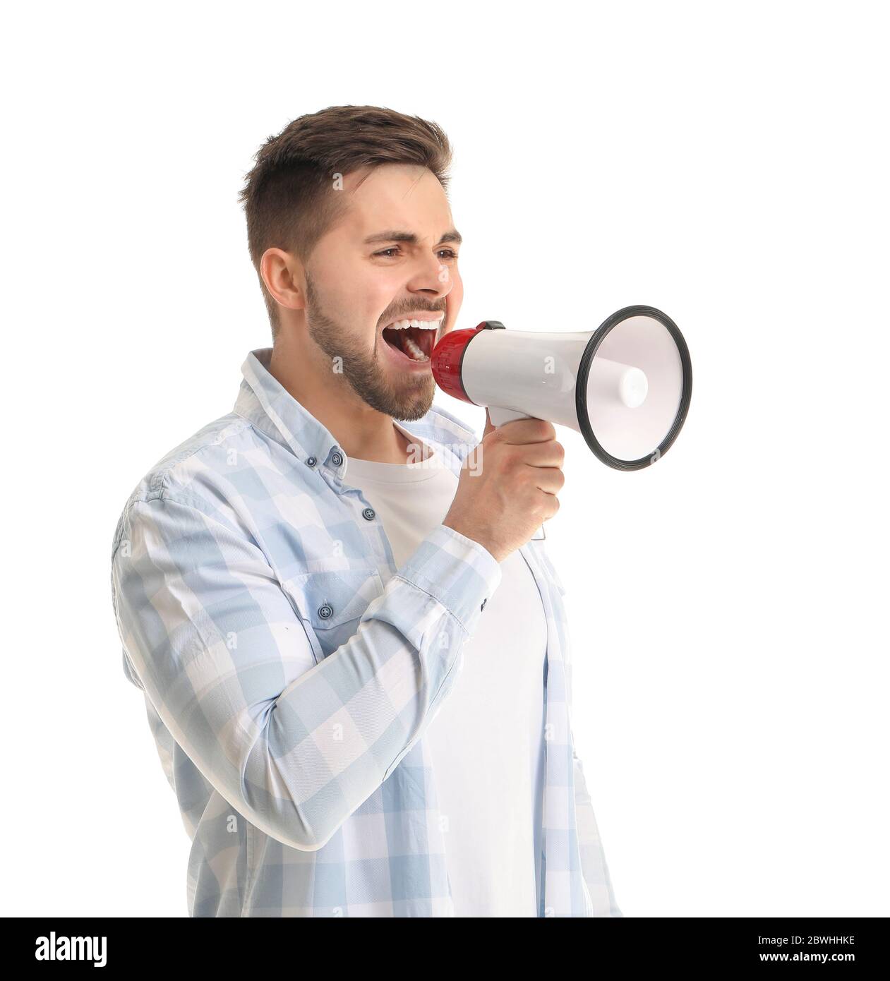 Young man with megaphone on white background Stock Photo - Alamy