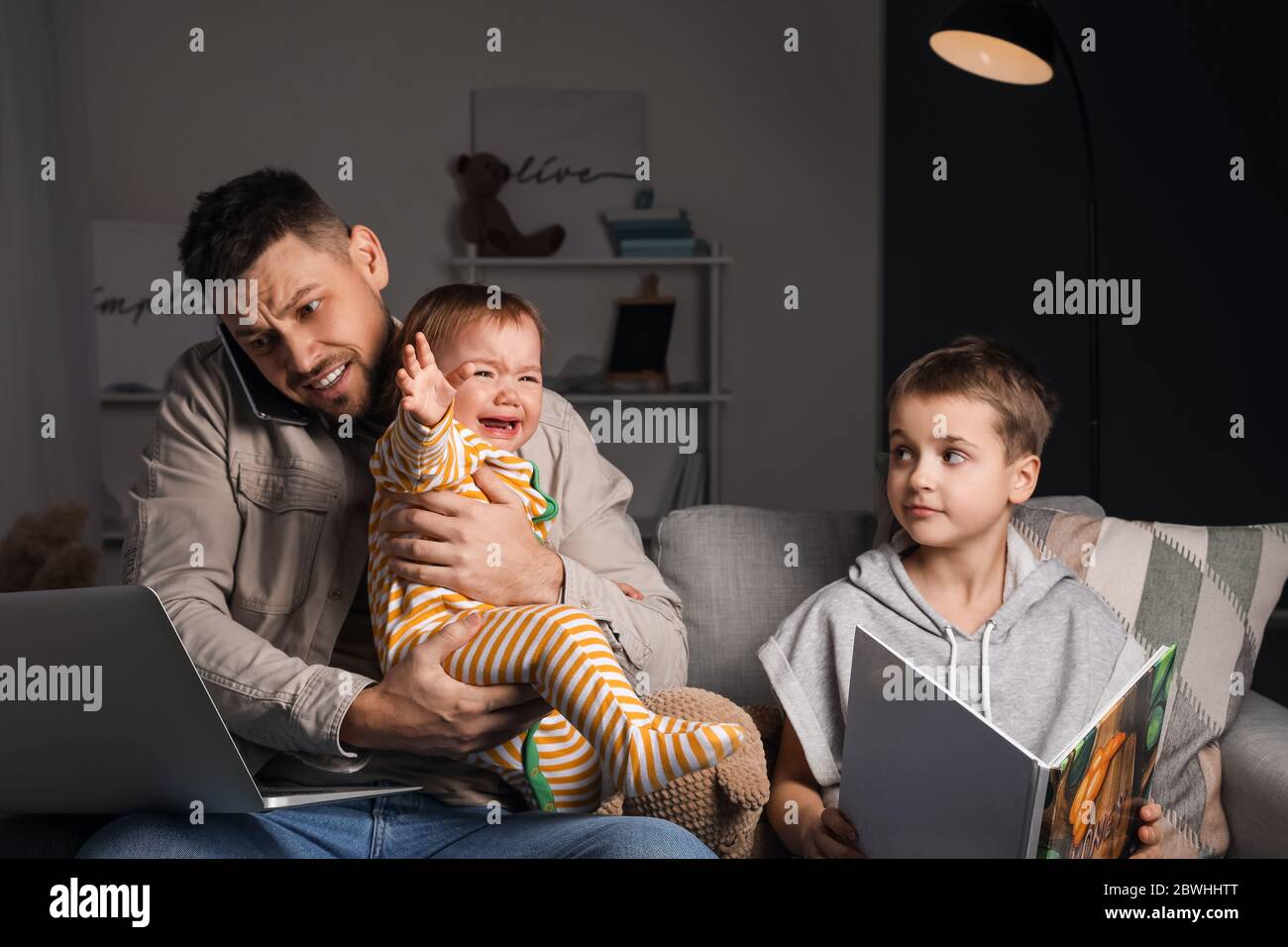 Baby with laptop crying hi-res stock photography and images - Alamy