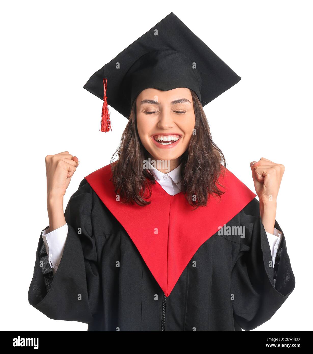 Happy female graduating student on white background Stock Photo - Alamy