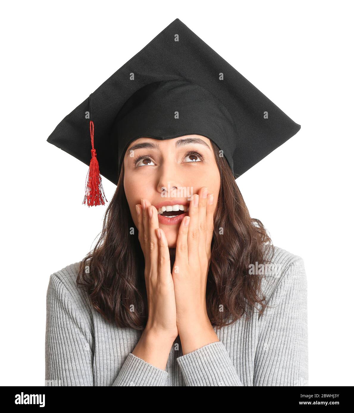 Female graduating student on white background Stock Photo - Alamy