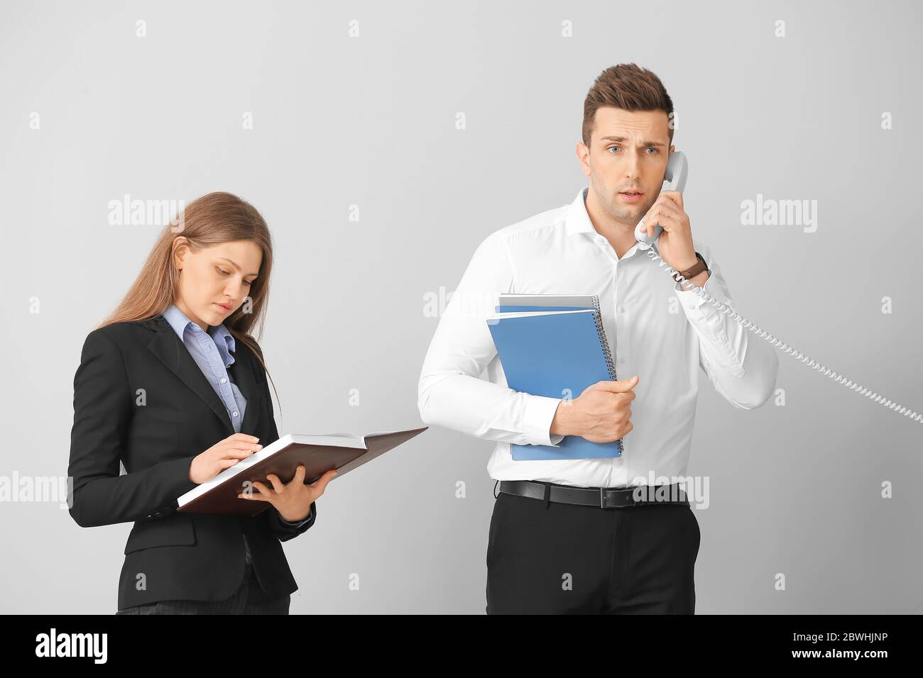Male boss talking secretary hi-res stock photography and images - Alamy
