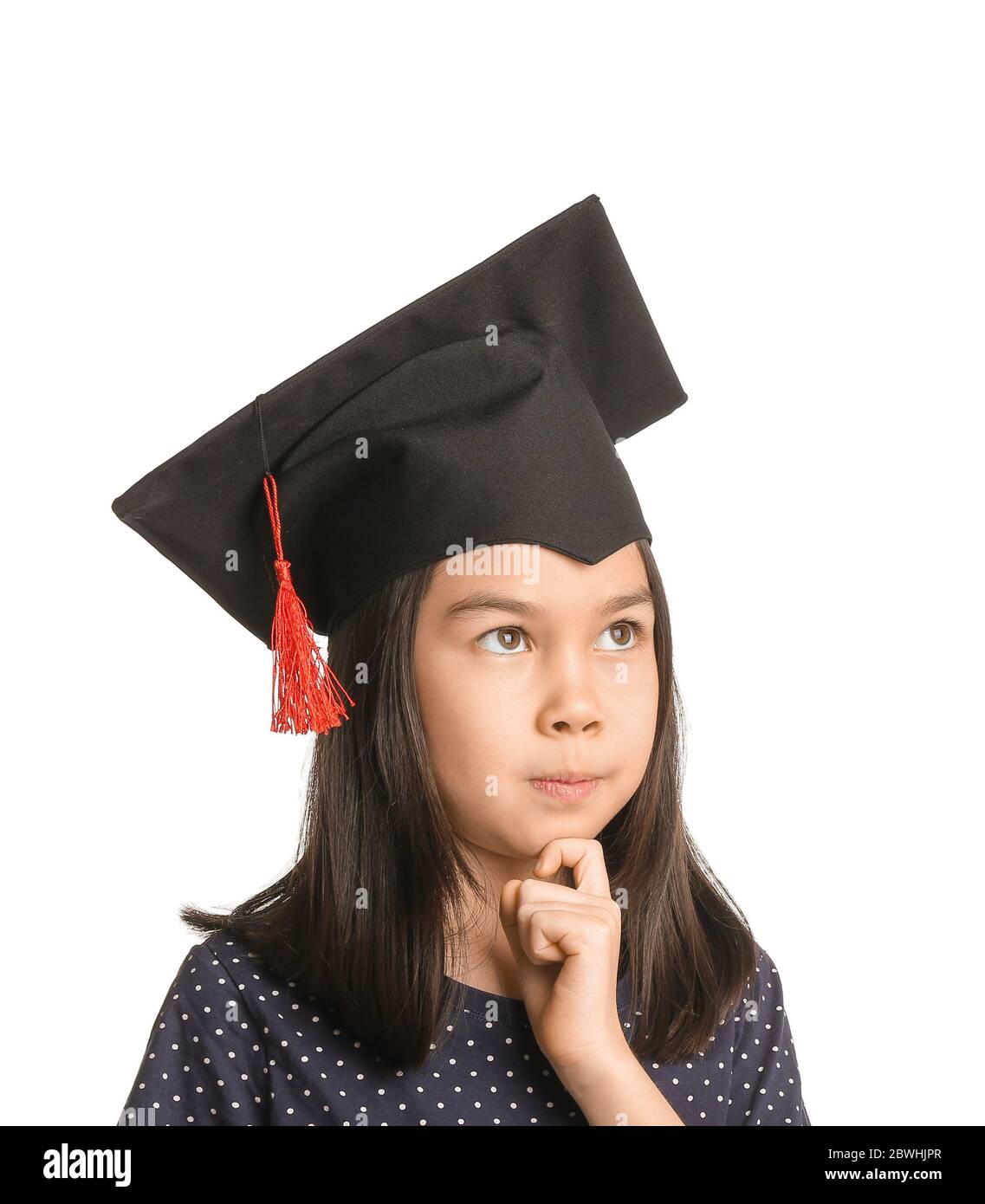 Little girl in graduation hat on white background Stock Photo - Alamy