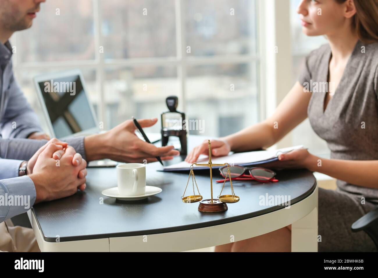 Men visiting lawyer in office Stock Photo - Alamy