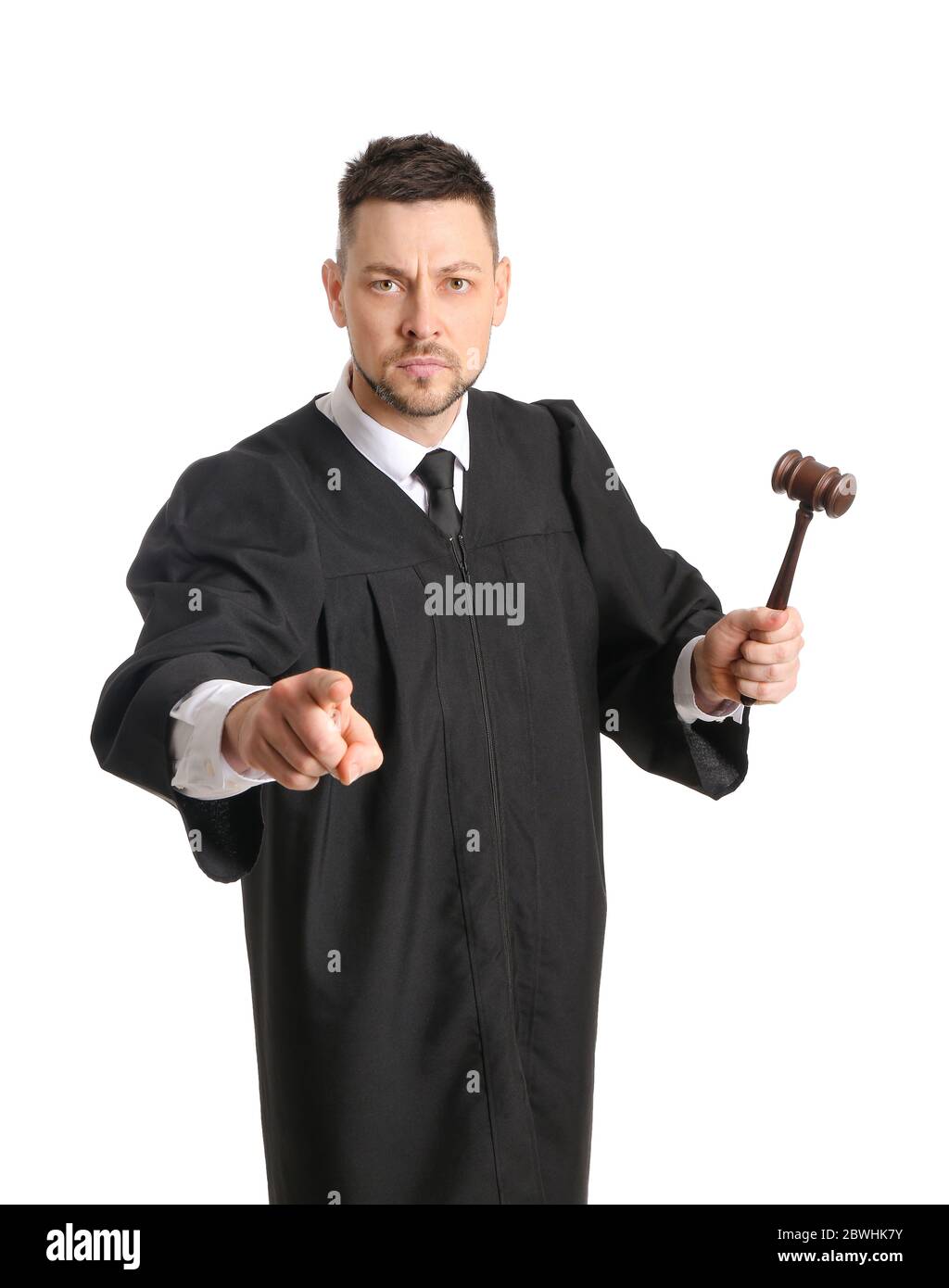 Strict male judge on white background Stock Photo - Alamy