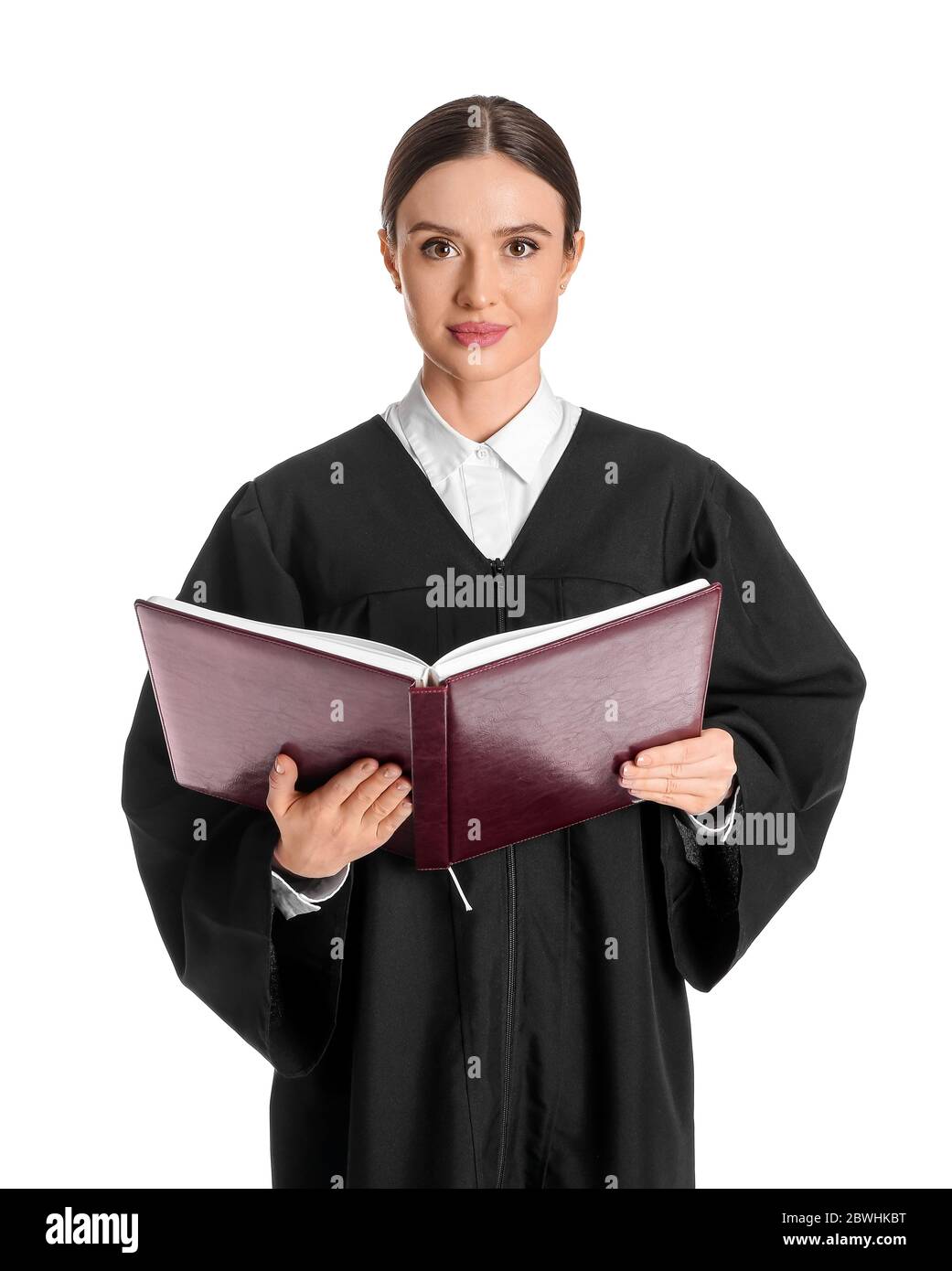Female judge with book on white background Stock Photo - Alamy