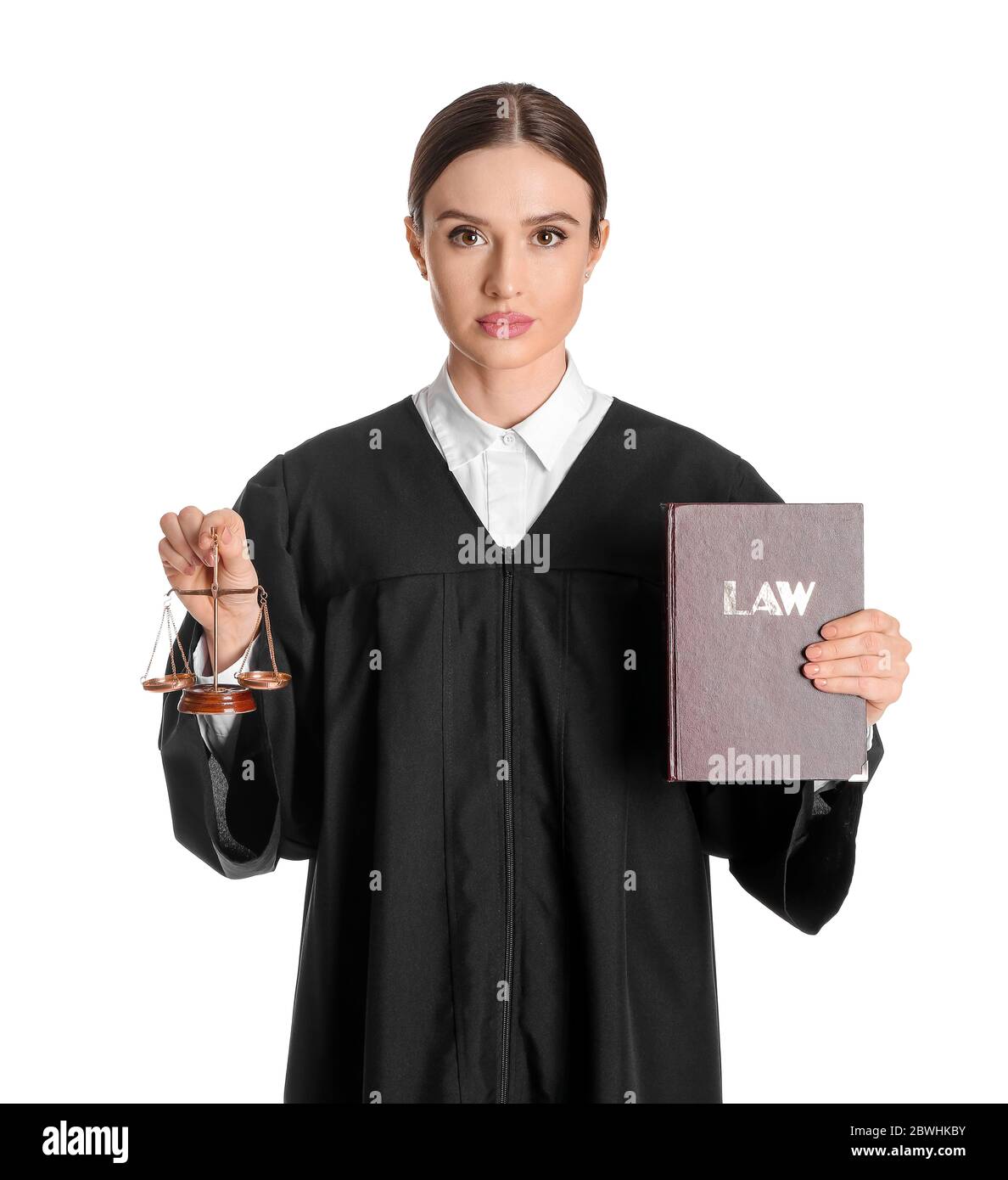 Female judge with book and scales of justice on white background Stock ...