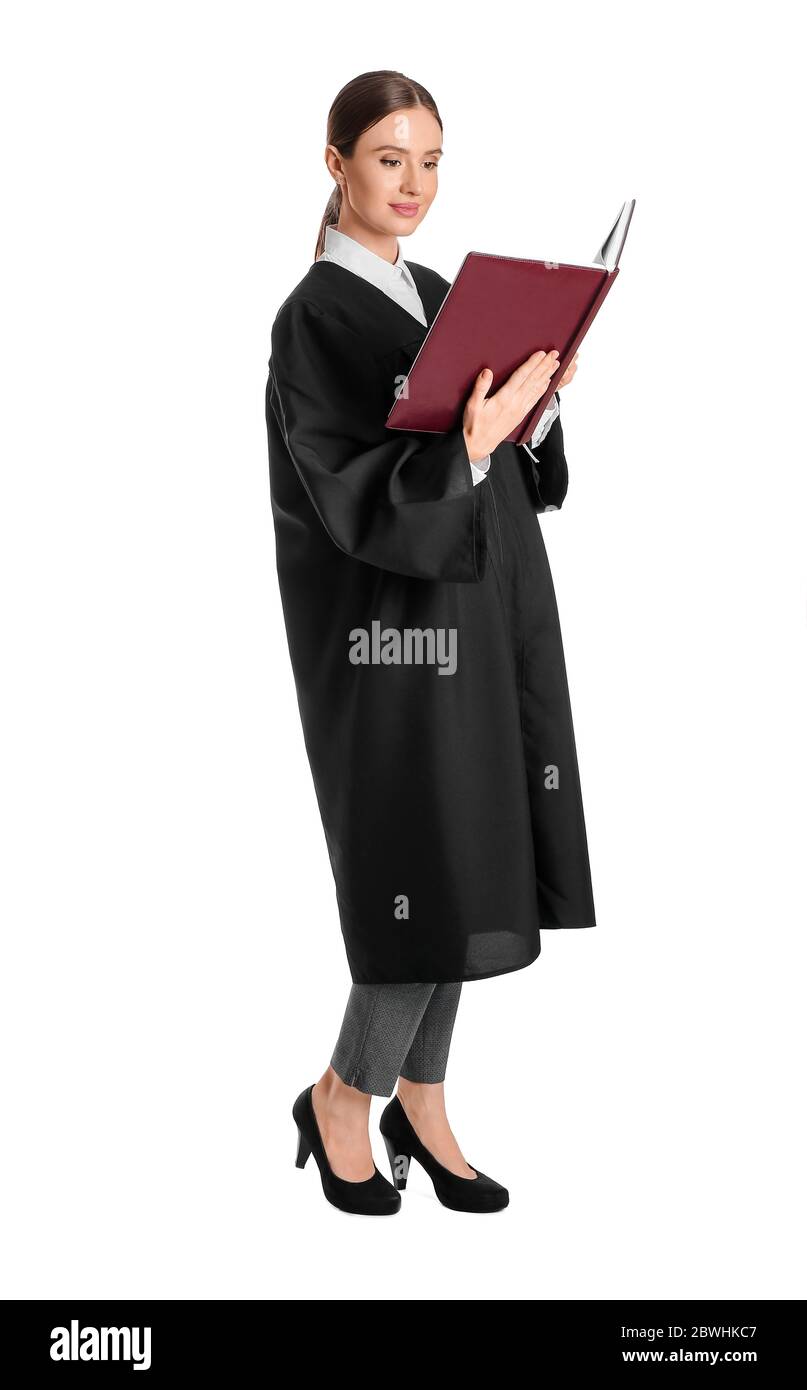 Female judge with book on white background Stock Photo - Alamy