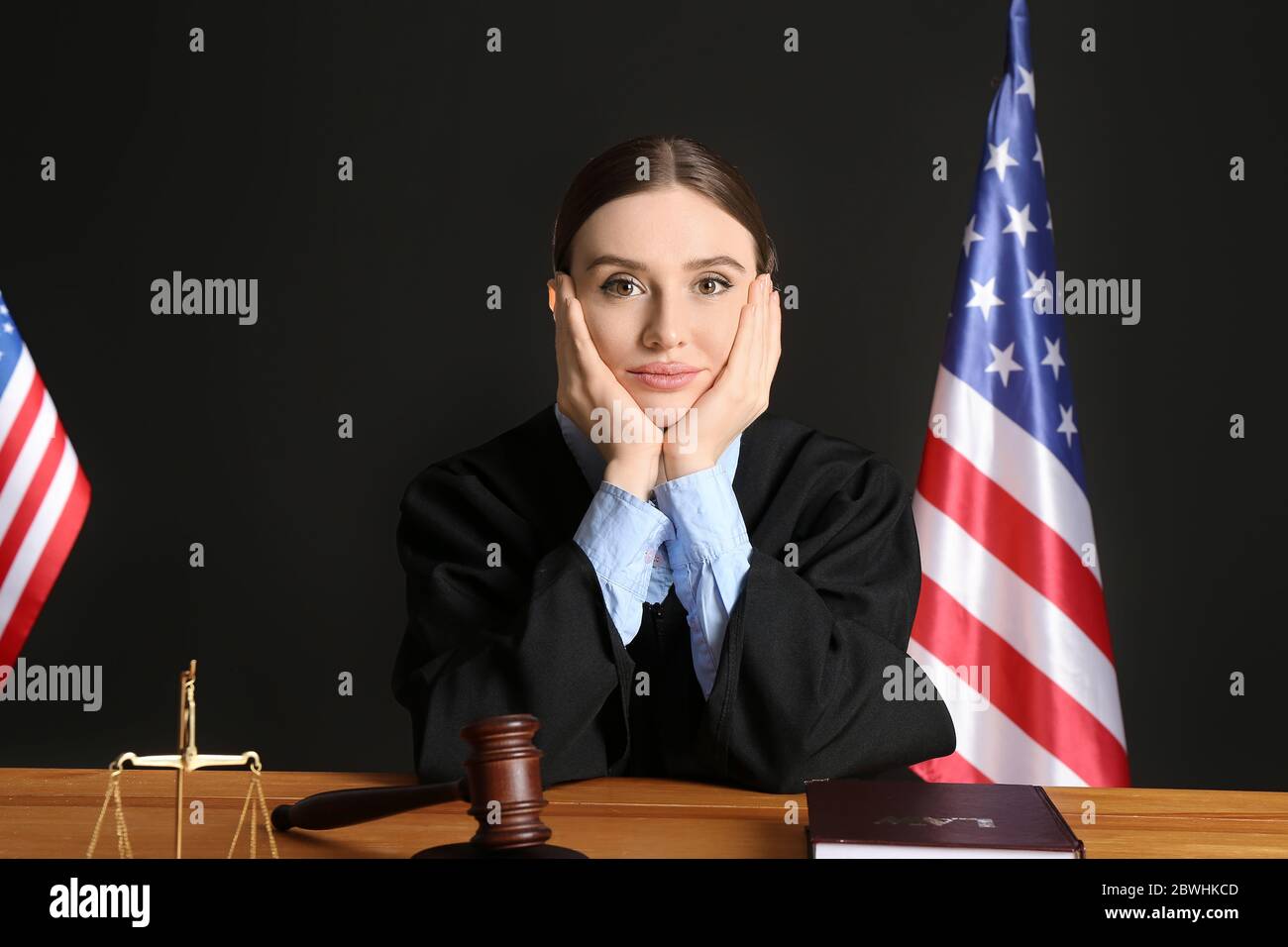 Female judge at table in courtroom Stock Photo - Alamy