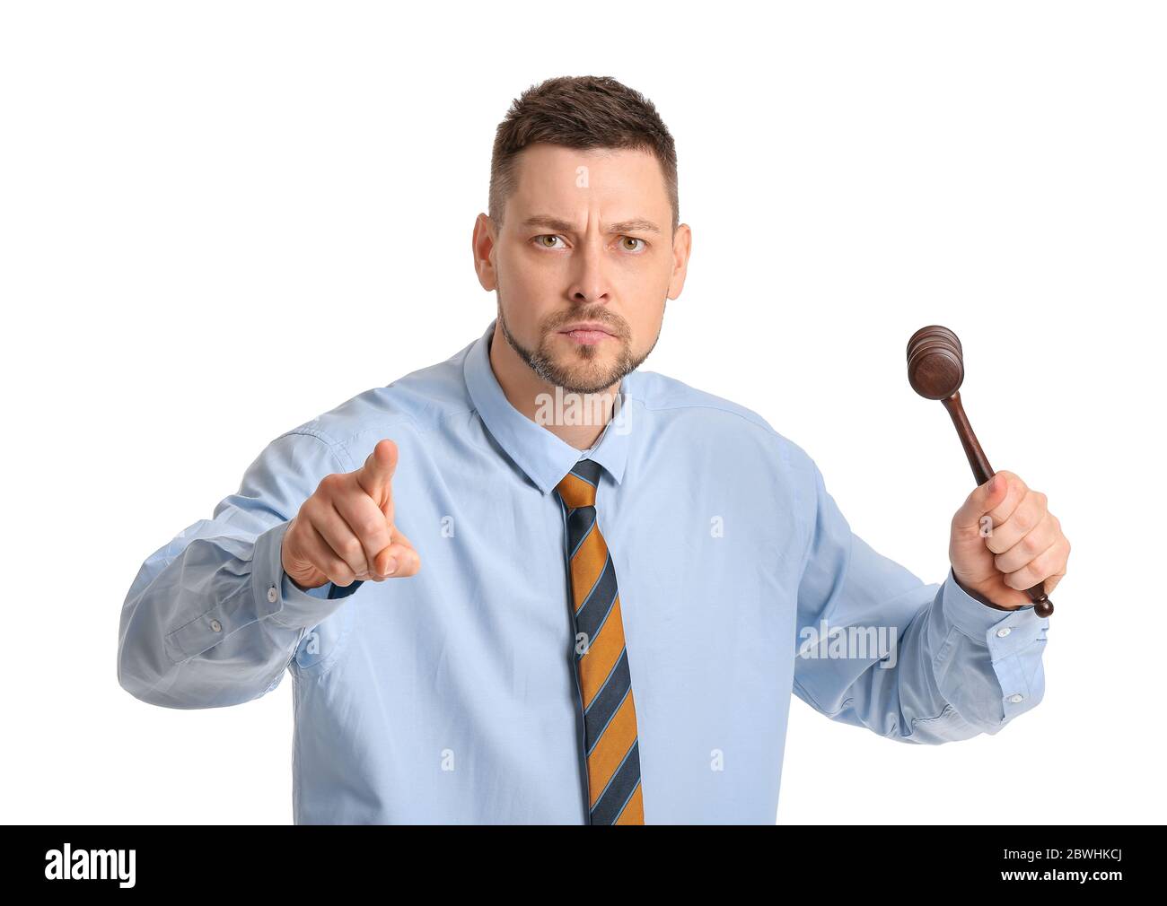 Strict male judge on white background Stock Photo - Alamy