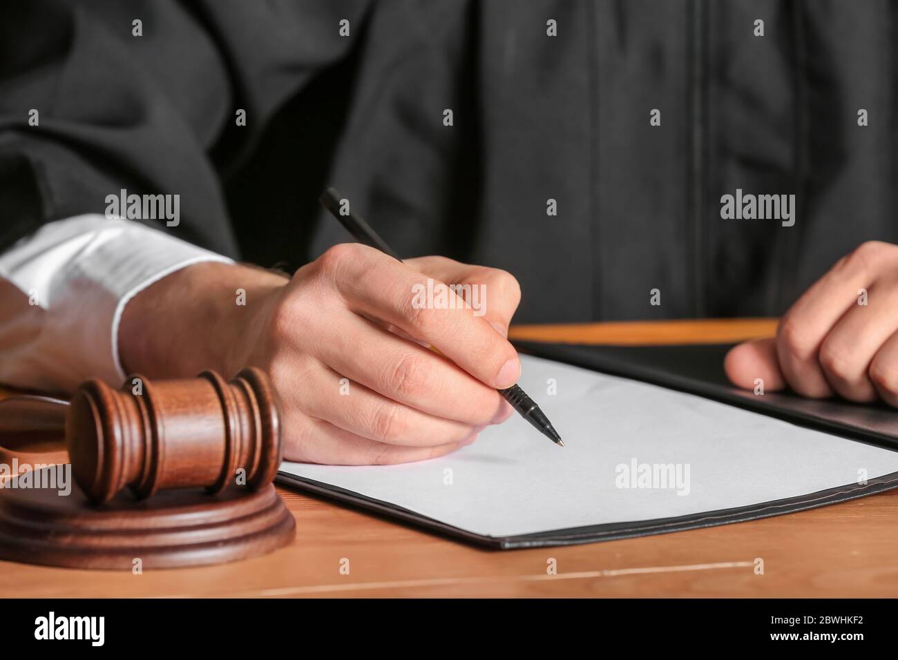 Male judge documents table hi-res stock photography and images - Alamy