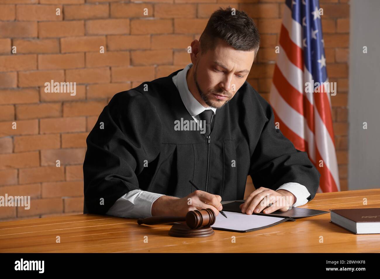 Male judge documents table hi-res stock photography and images - Alamy