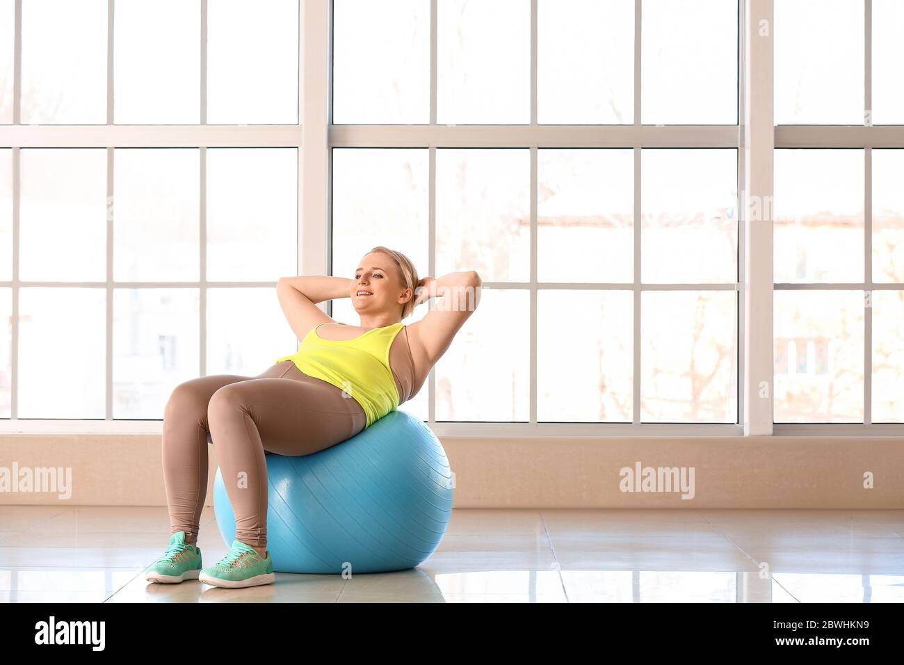 Overweight woman training ball hi-res stock photography and images - Alamy