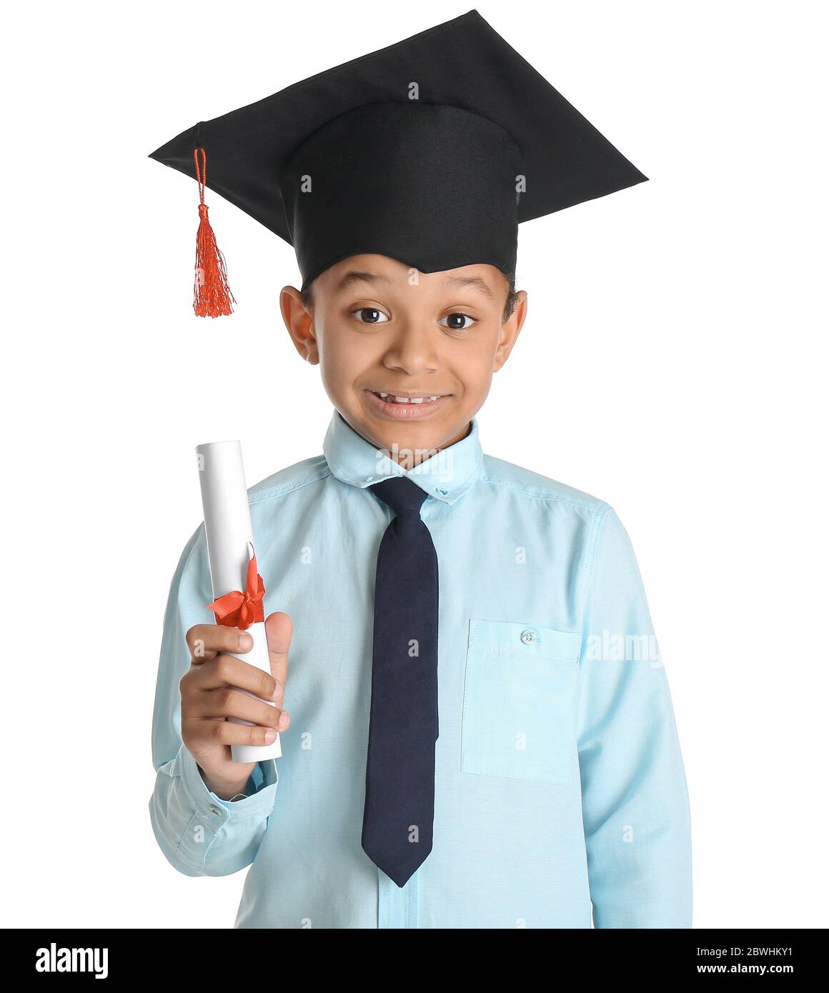 Little African-American boy in graduation hat and with diploma on white ...