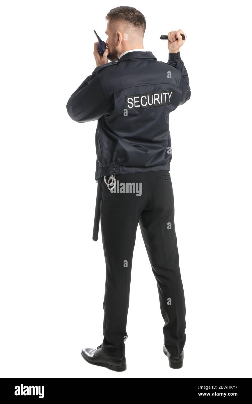 Male security guard with flashlight on white background Stock Photo - Alamy