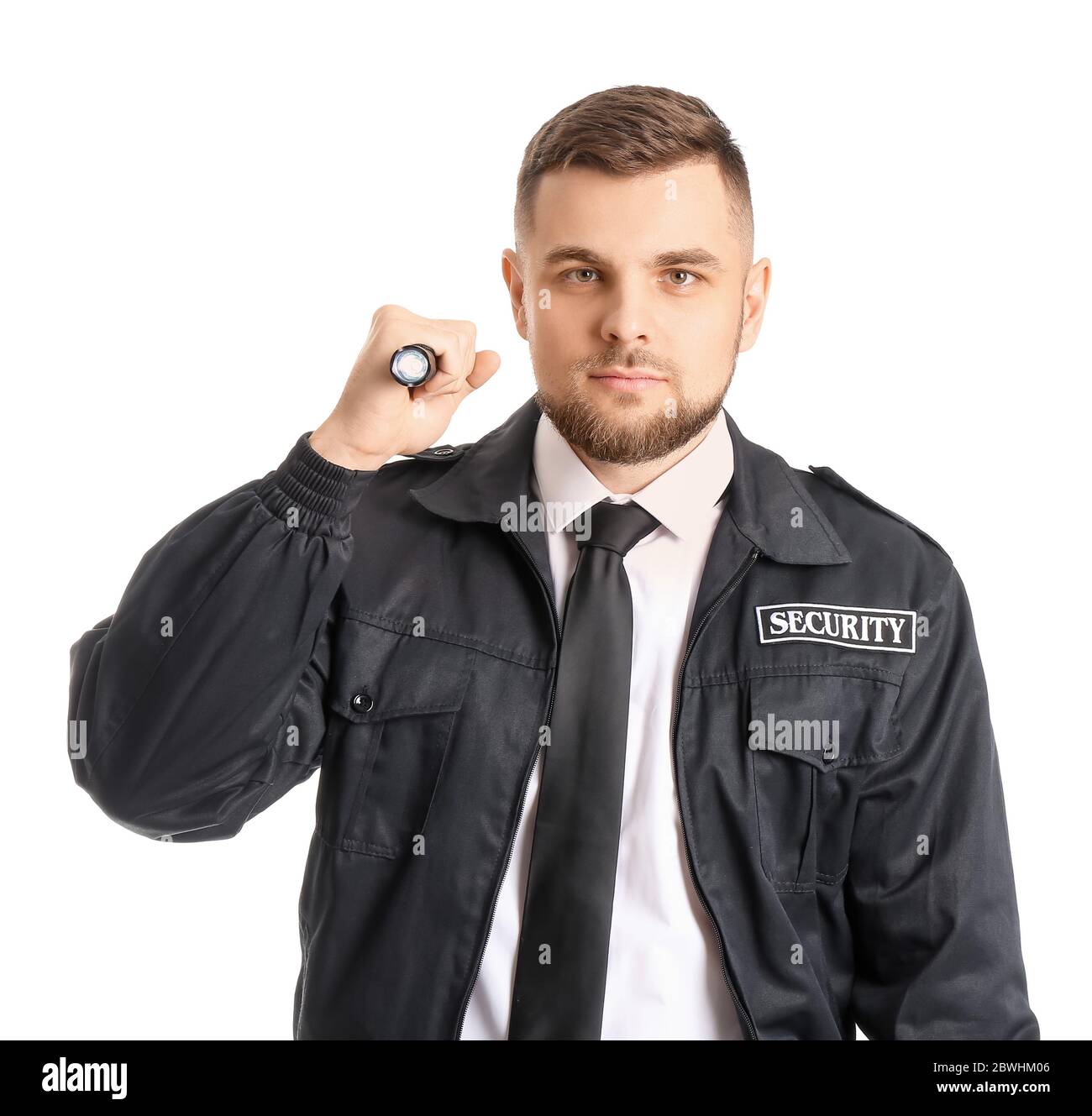 Male security guard with flashlight on white background Stock Photo - Alamy