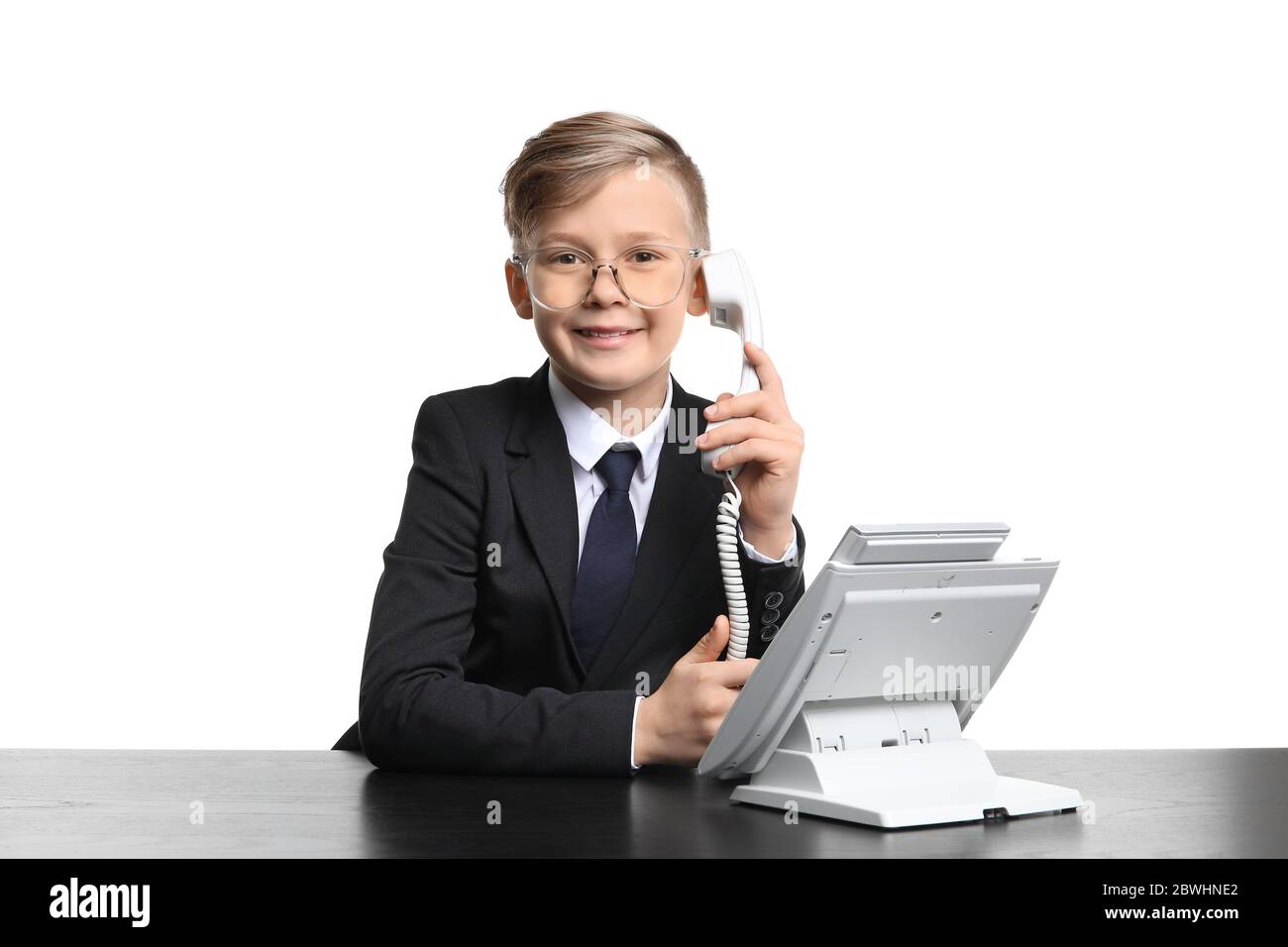 Little secretary working against white background Stock Photo - Alamy