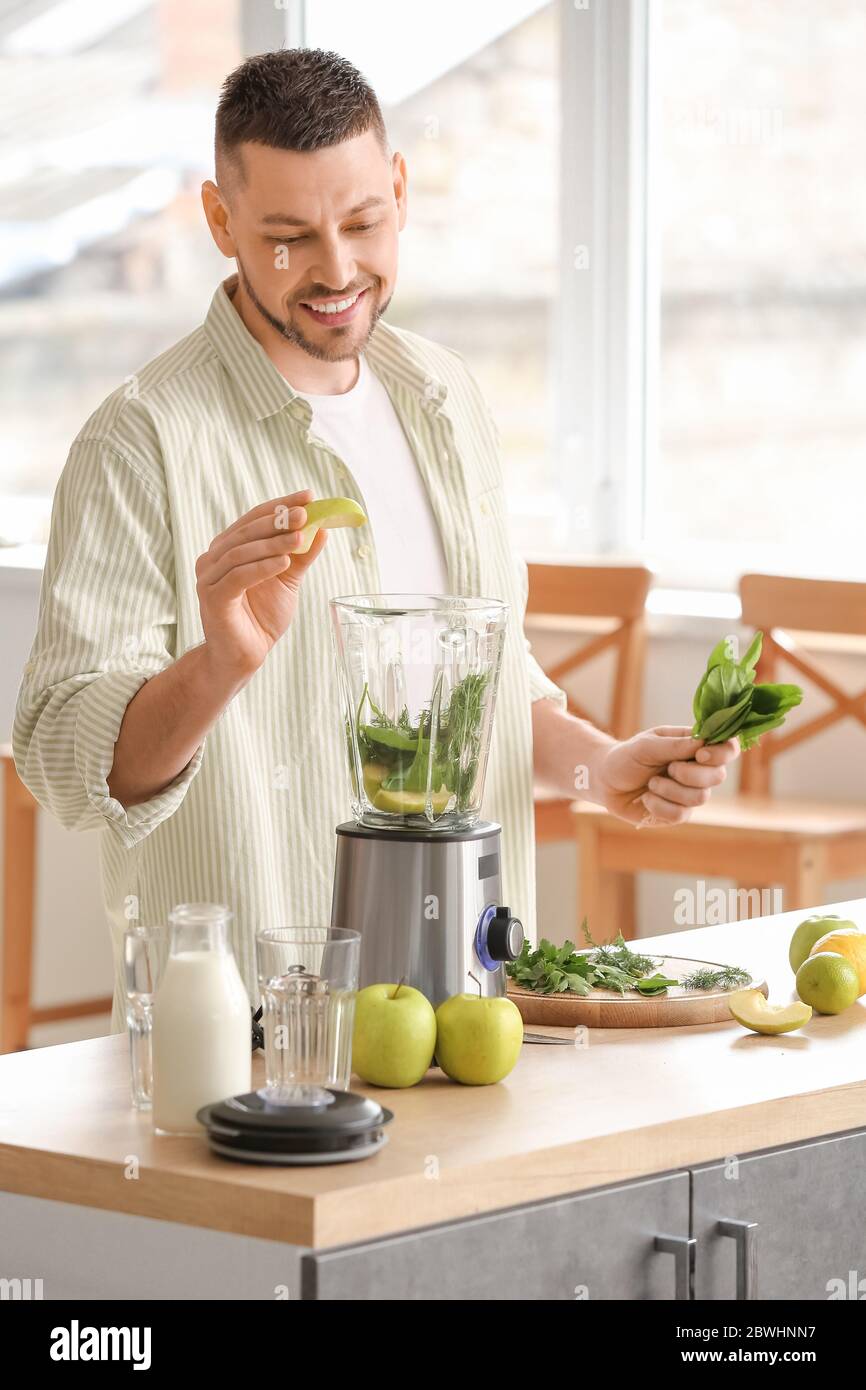 Man making healthy smoothie hi-res stock photography and images - Alamy