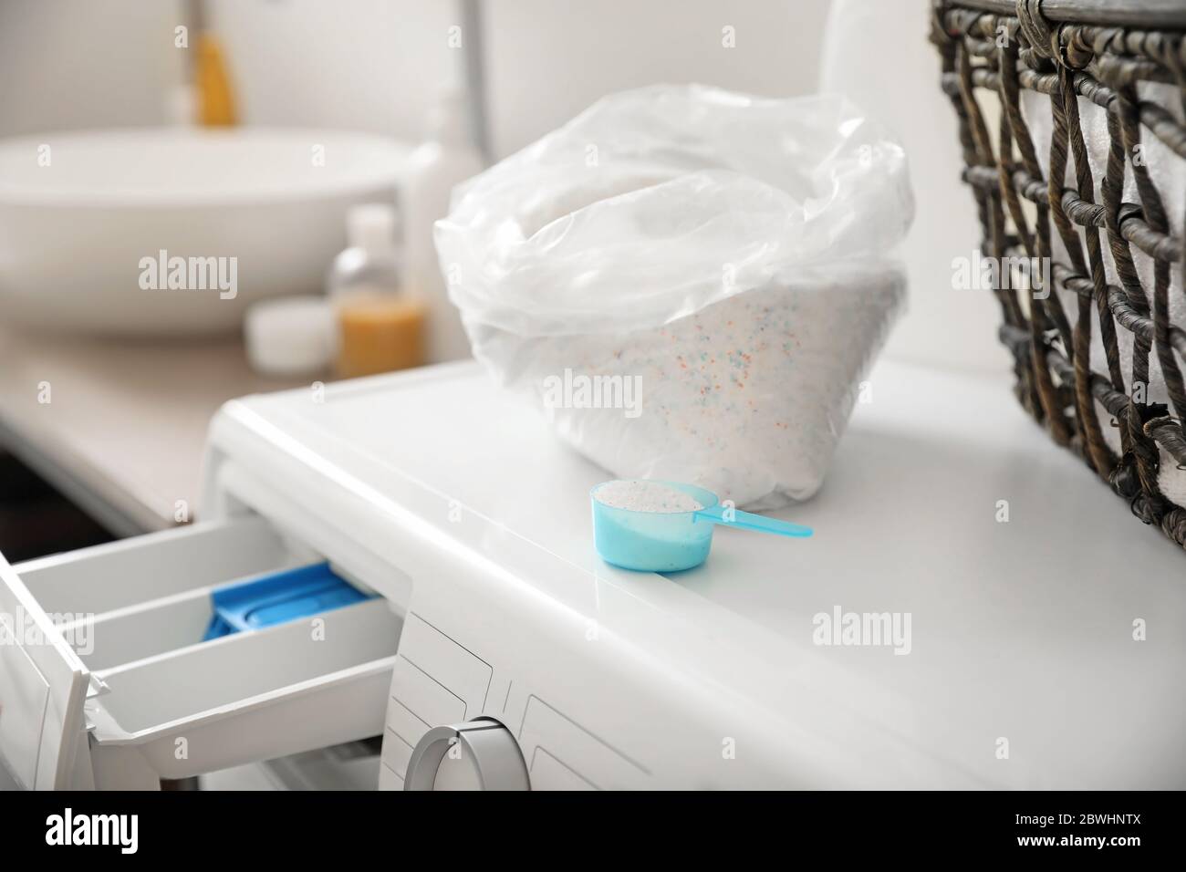 Laundry detergent on washing machine Stock Photo - Alamy