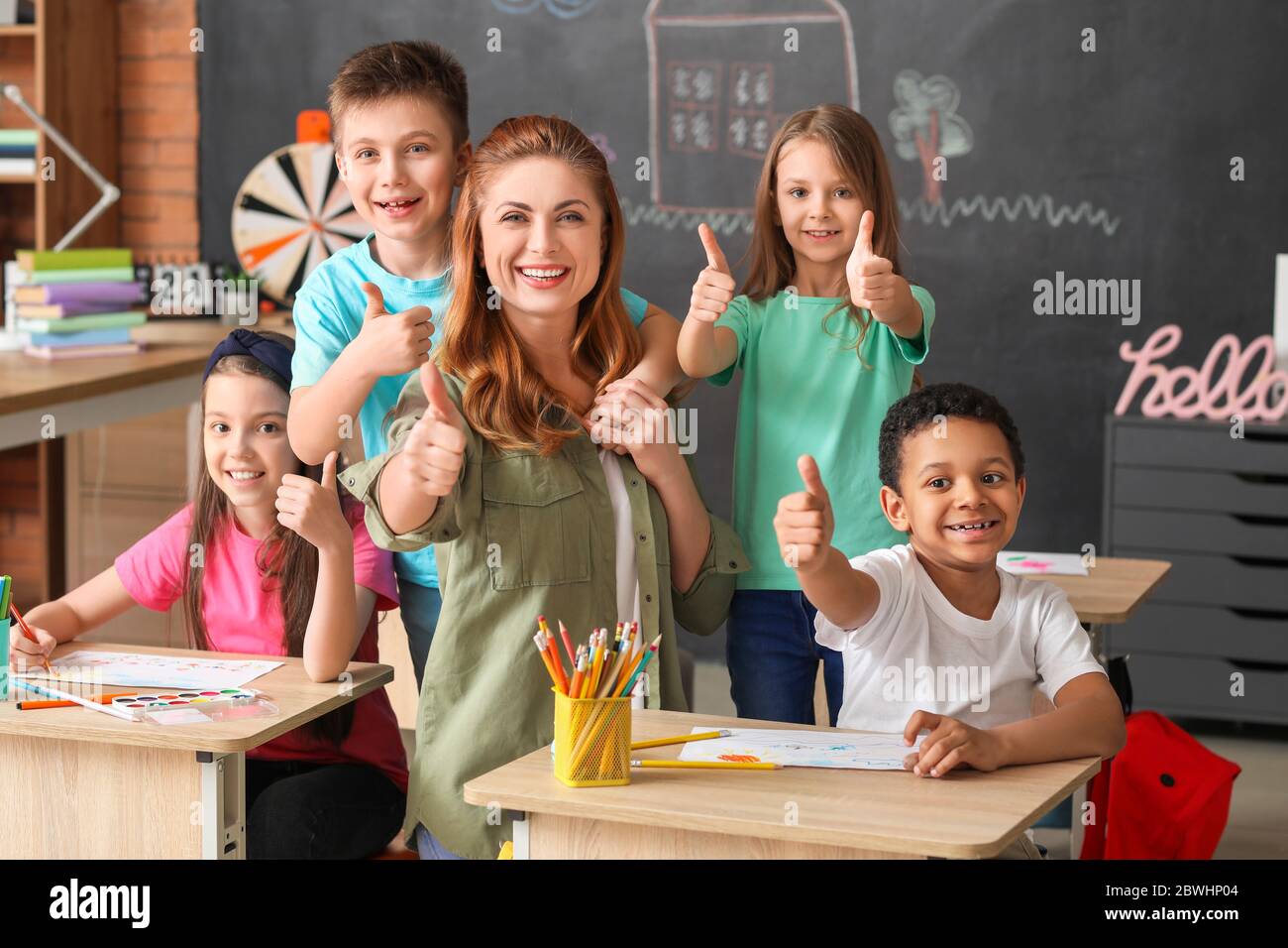 Drawing teacher giving classes at school Stock Photo - Alamy