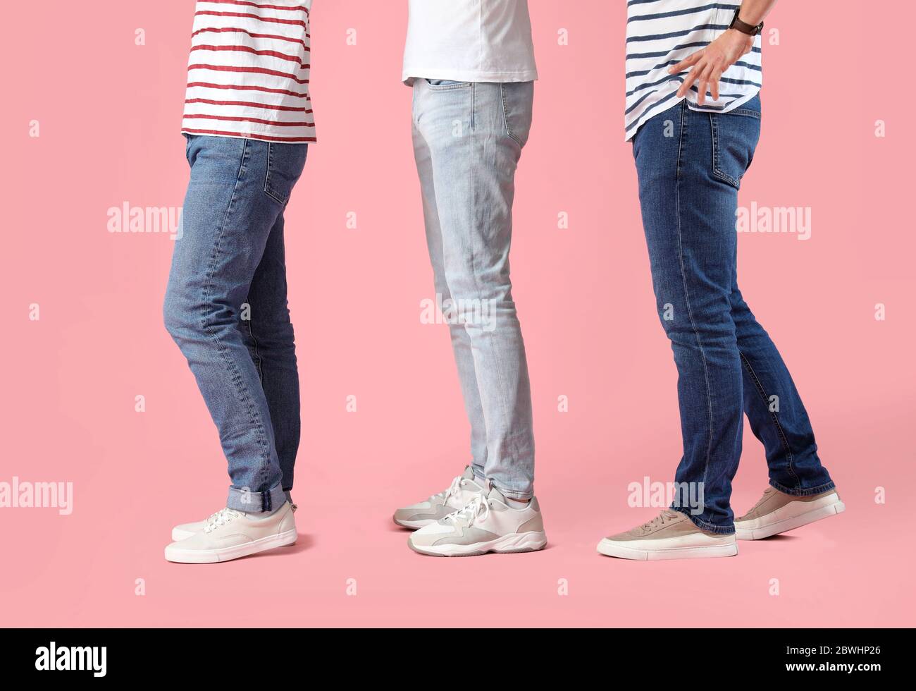 People waiting in line on color background Stock Photo - Alamy