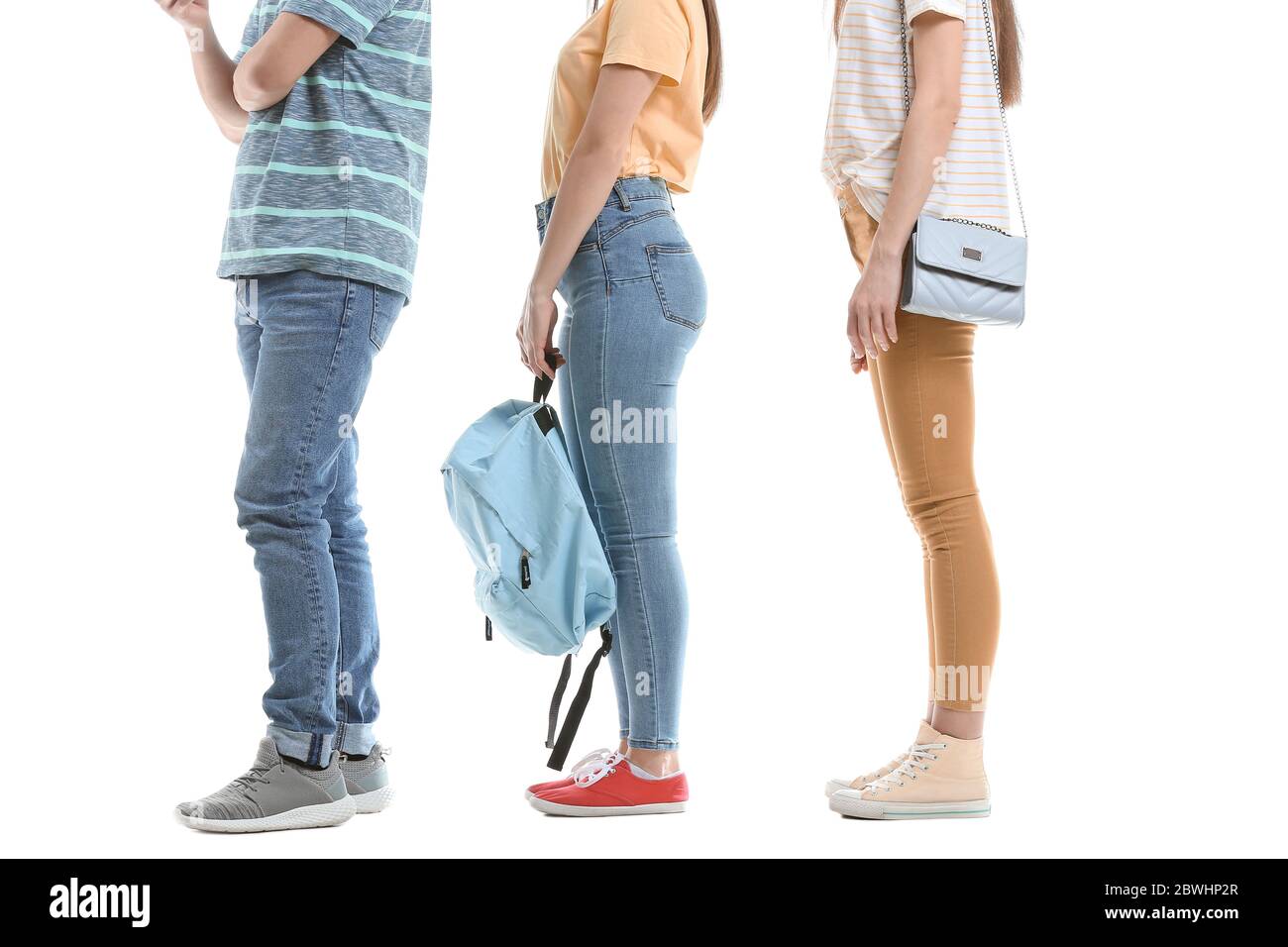 Students waiting in line on white background Stock Photo - Alamy