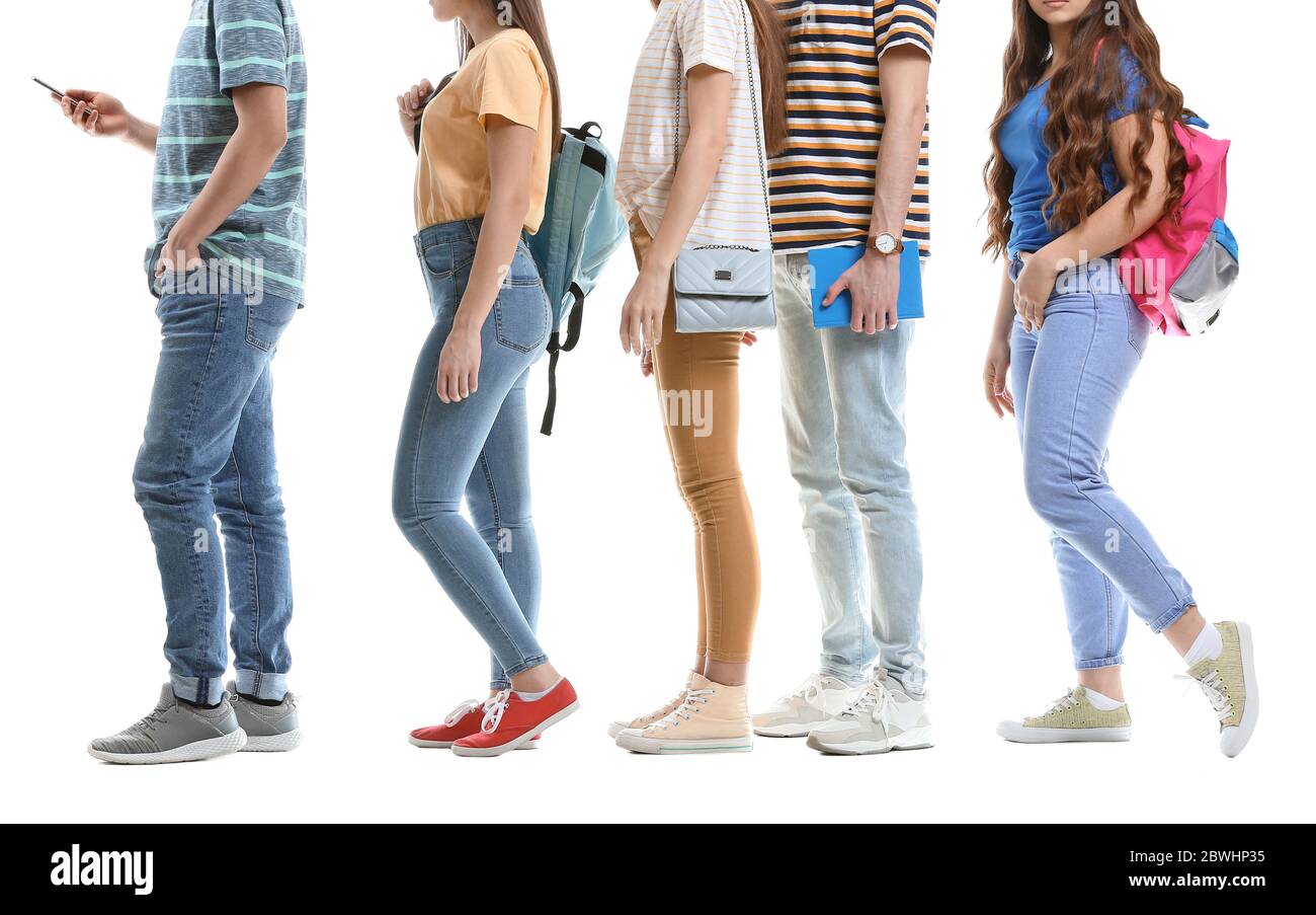 Students waiting in line on white background Stock Photo - Alamy